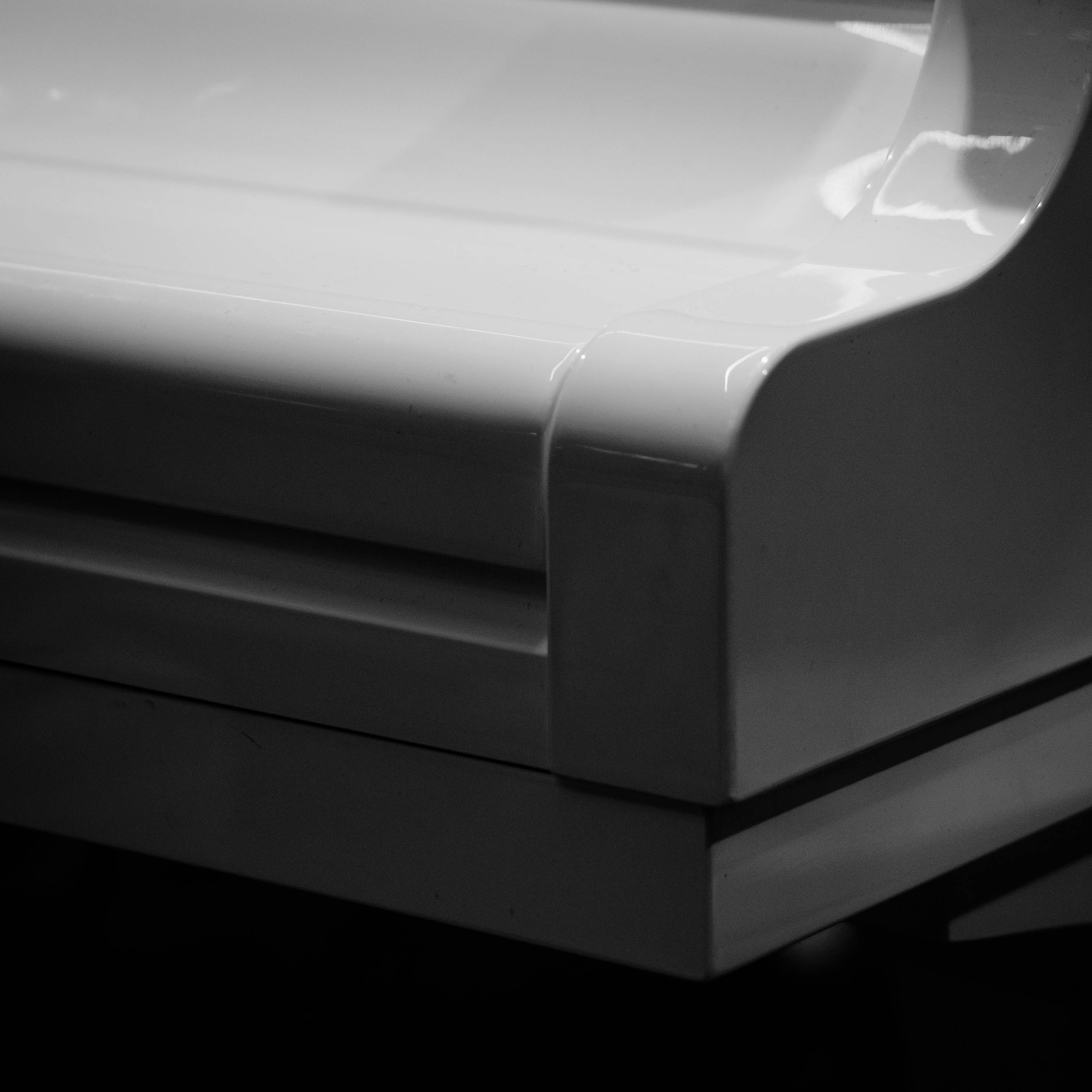Monochrome Piano Lid: Subtle Curves and Reflections