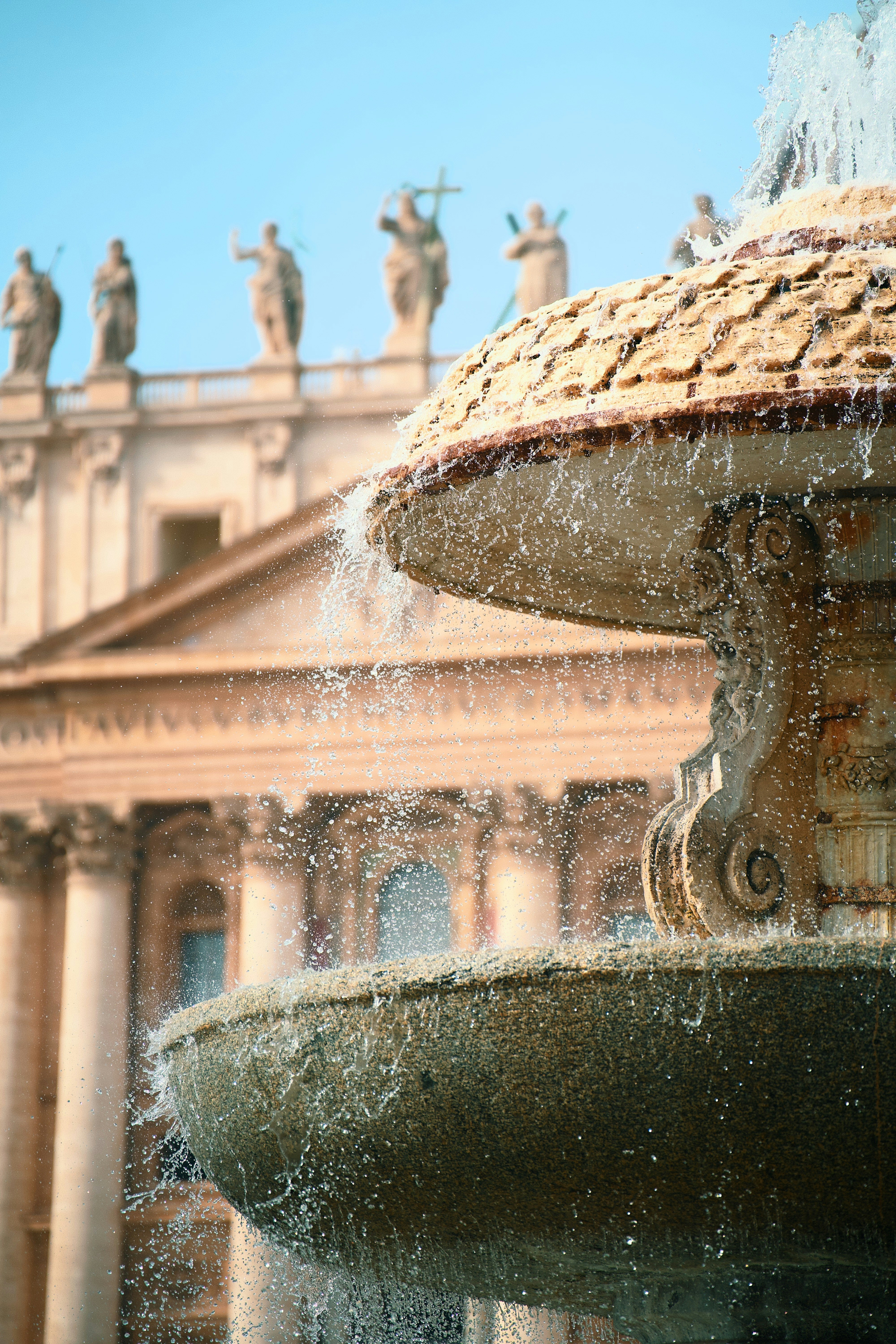Cascade of Stone and Sky: A Fountain’s Gentle Gaze at a Historic Terrace