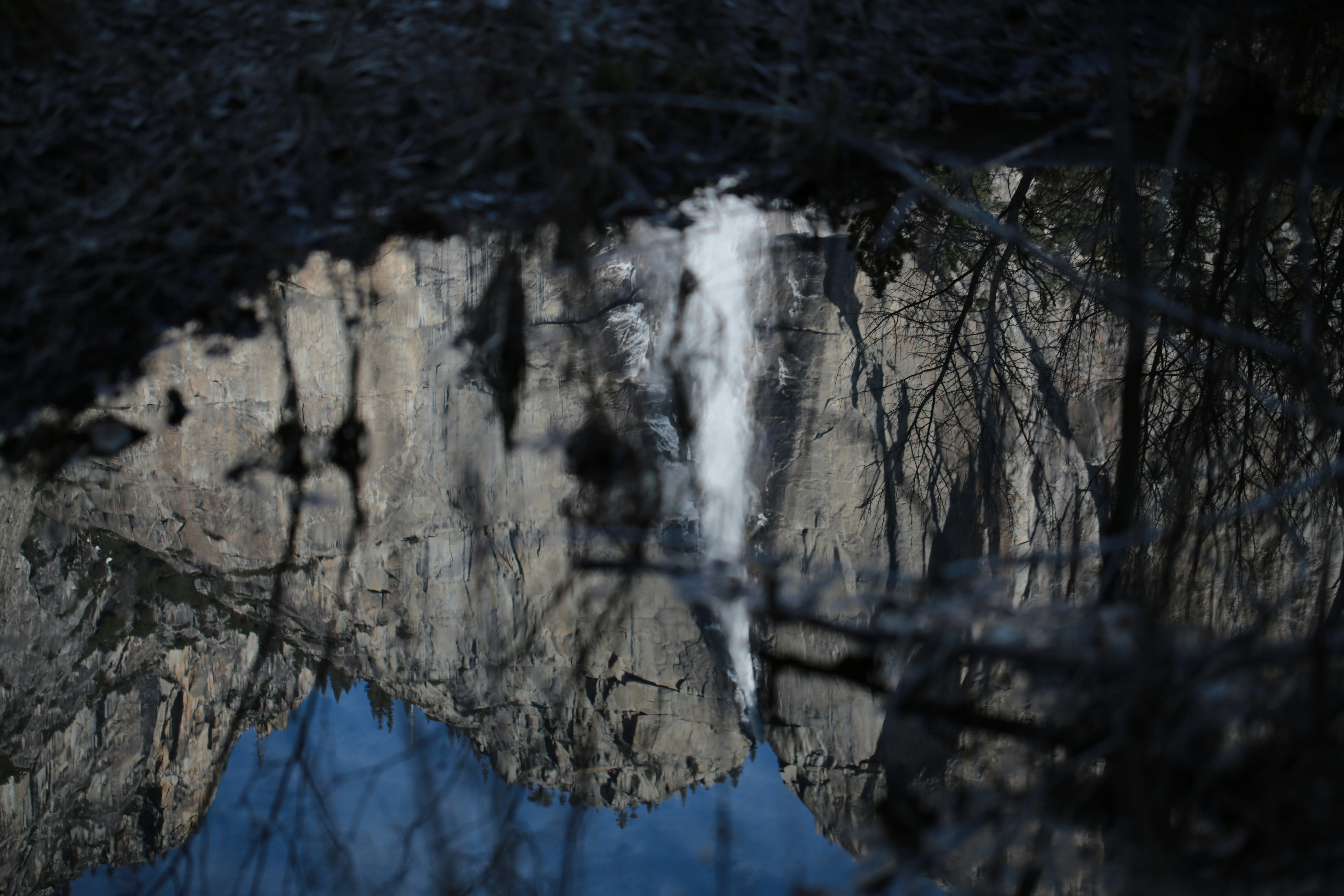 Suspended in Stone: Echoes of a Waterfall Reversing the Cliff