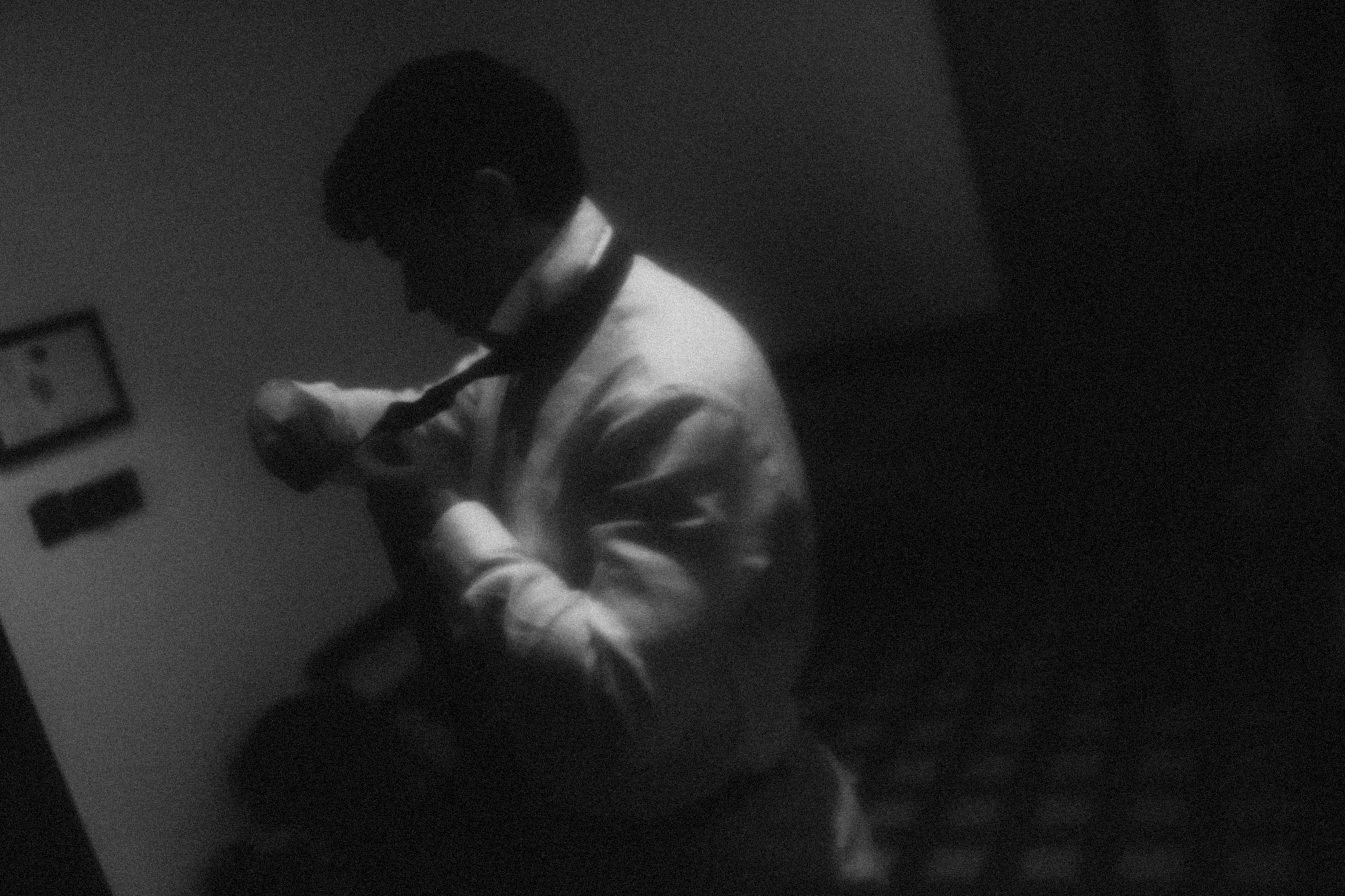 Dark Corridor Portrait: A Veteran of the Frame Chooses Focus