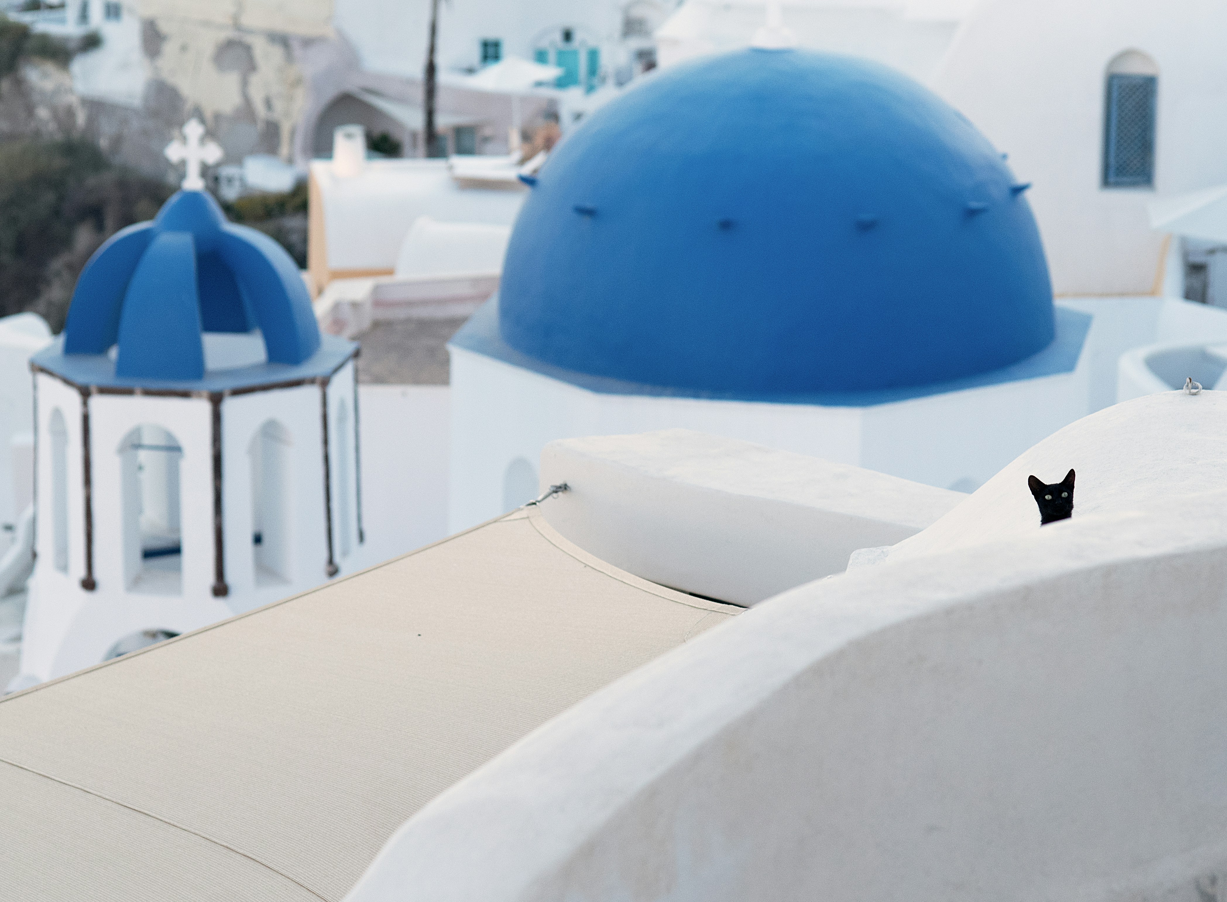 Blue-Domed Calm: White Architecture Under Soft Sky