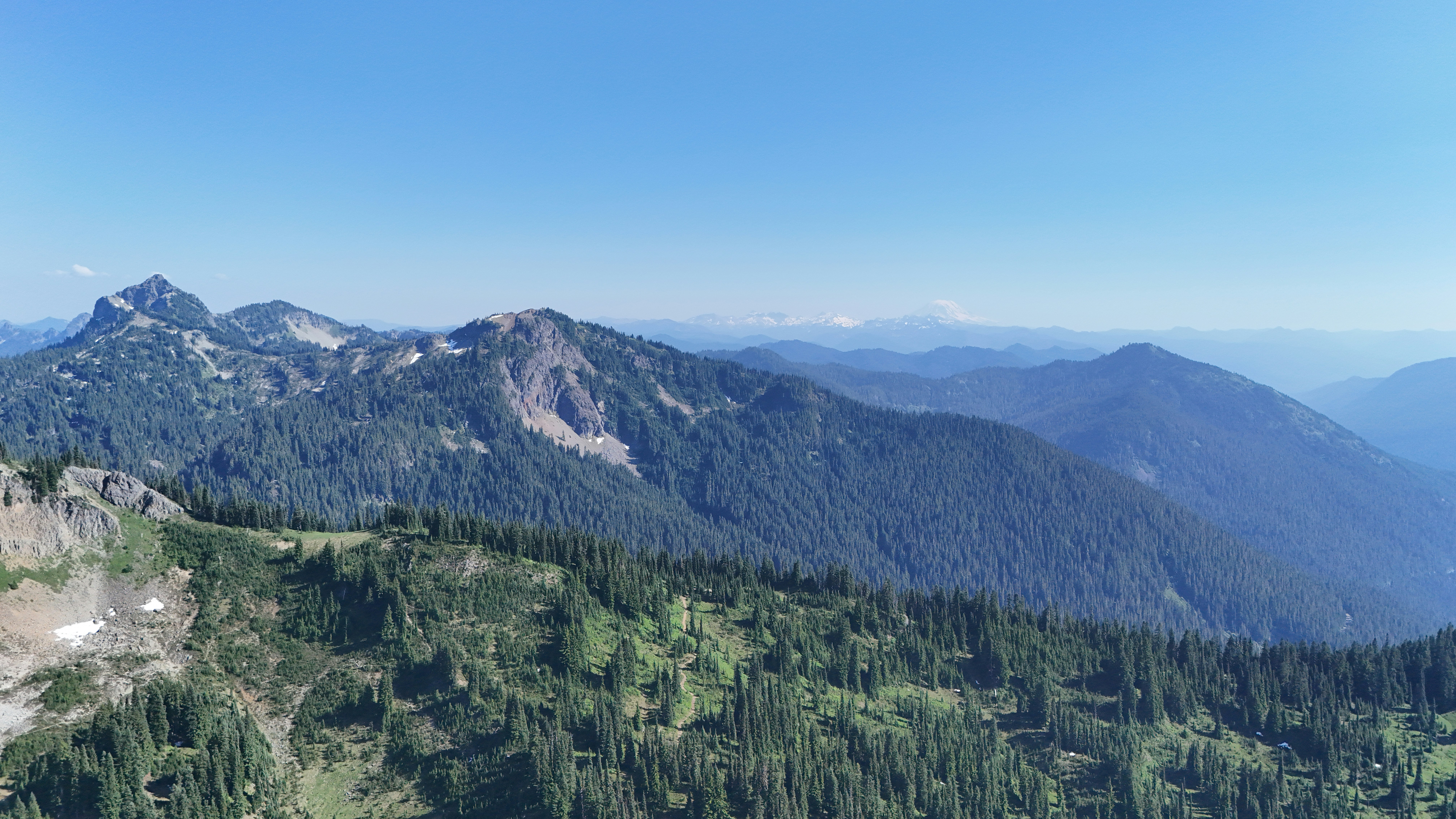 Azure Ridge: a sweeping alpine panorama from above the forest