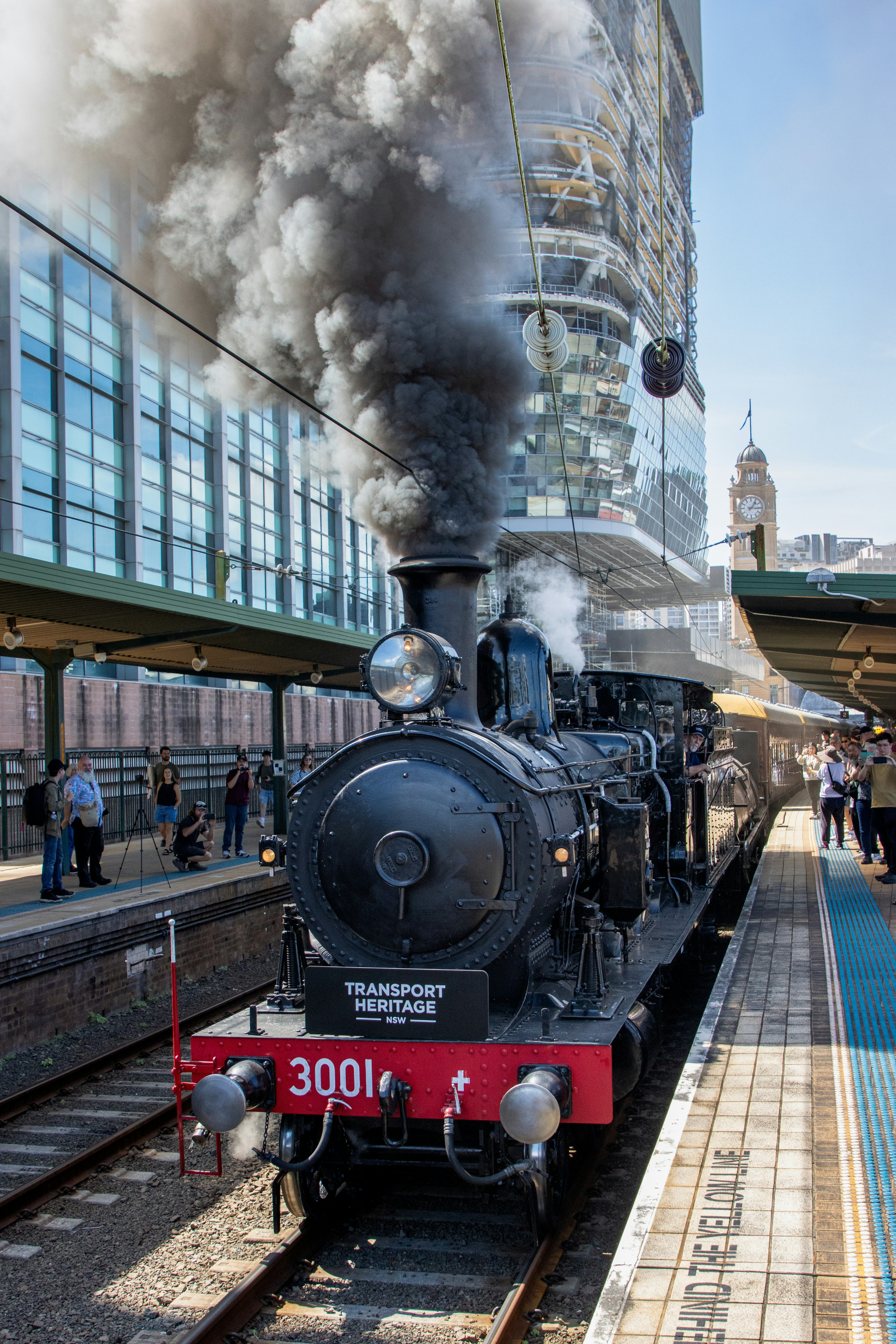 Steam Locomotive at City Platform: A Portrait of Heritage and Steel