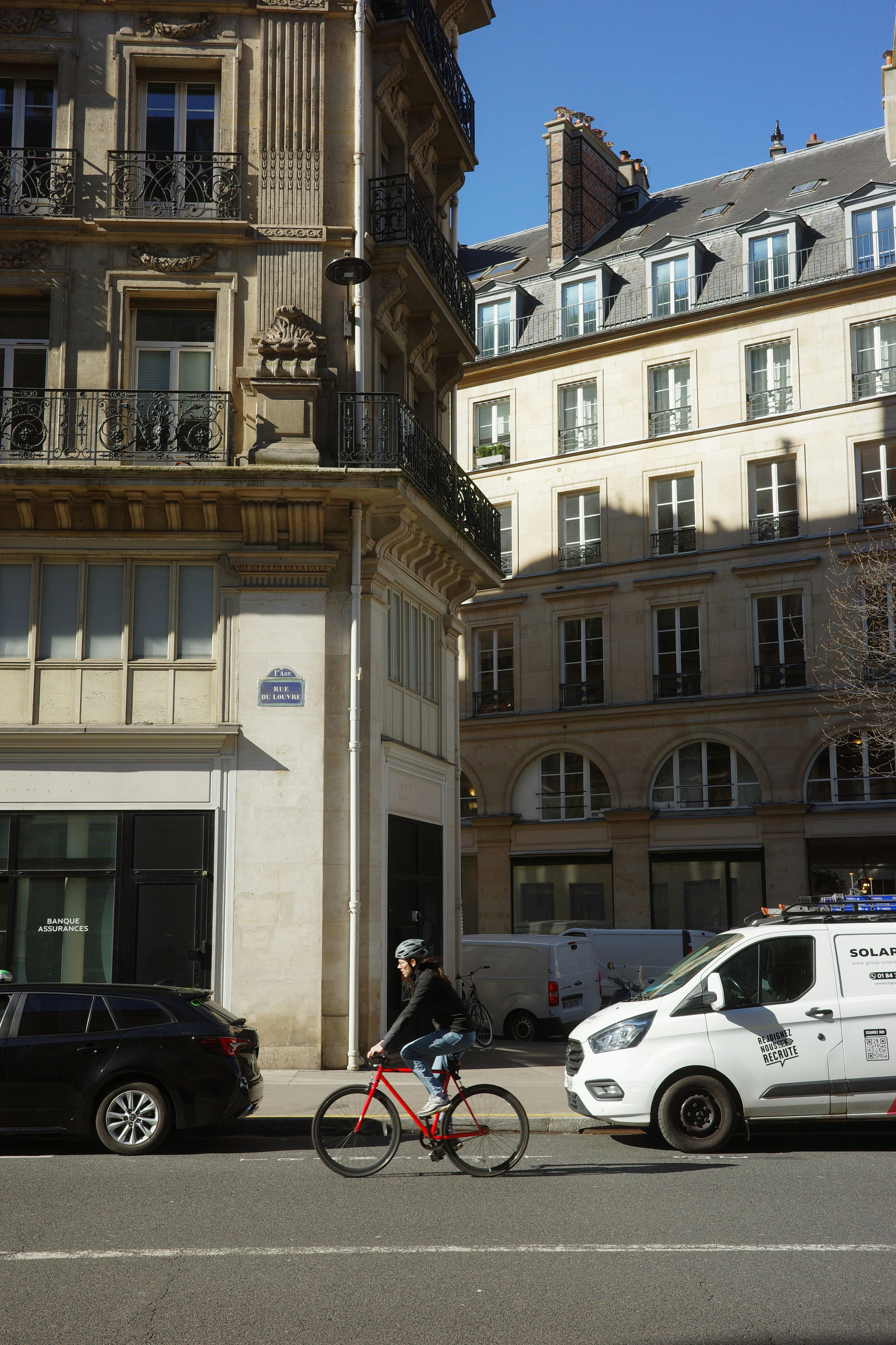 Red Bicycle under European Facades