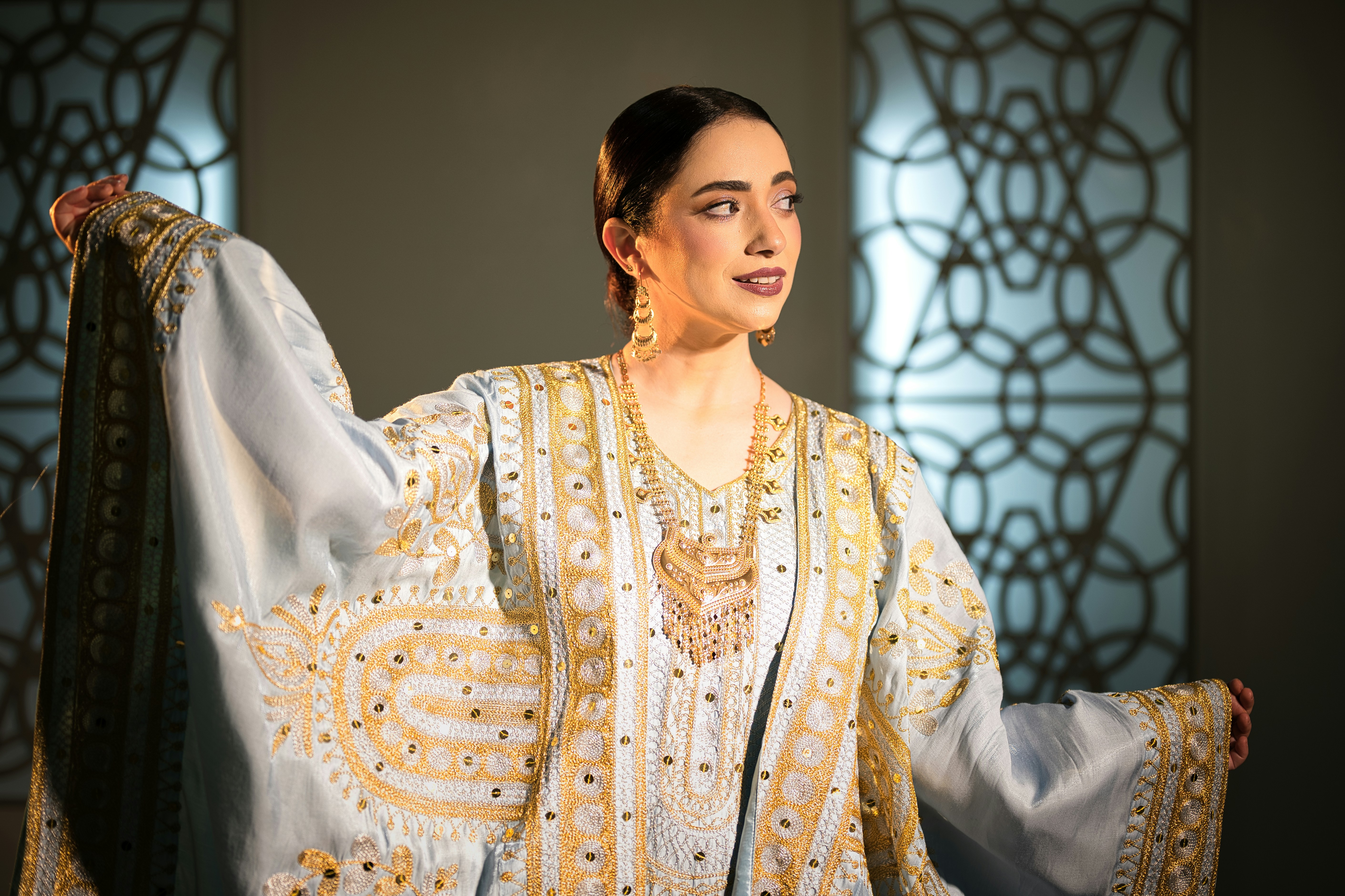 Grace in Golden Garments: A Dancer Illuminated