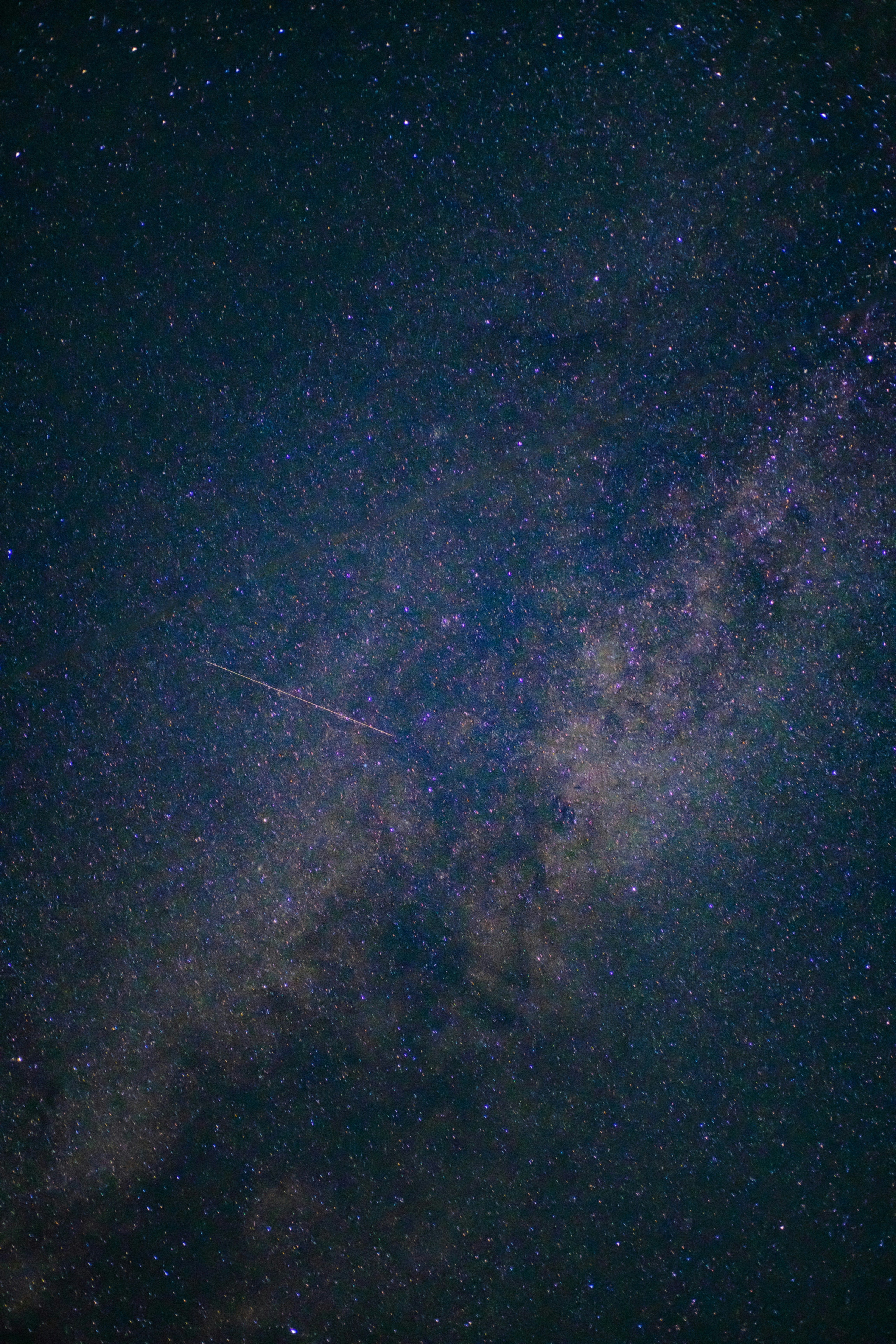 Meteor Trail Across the Milky Way: A Quiet Night Sky