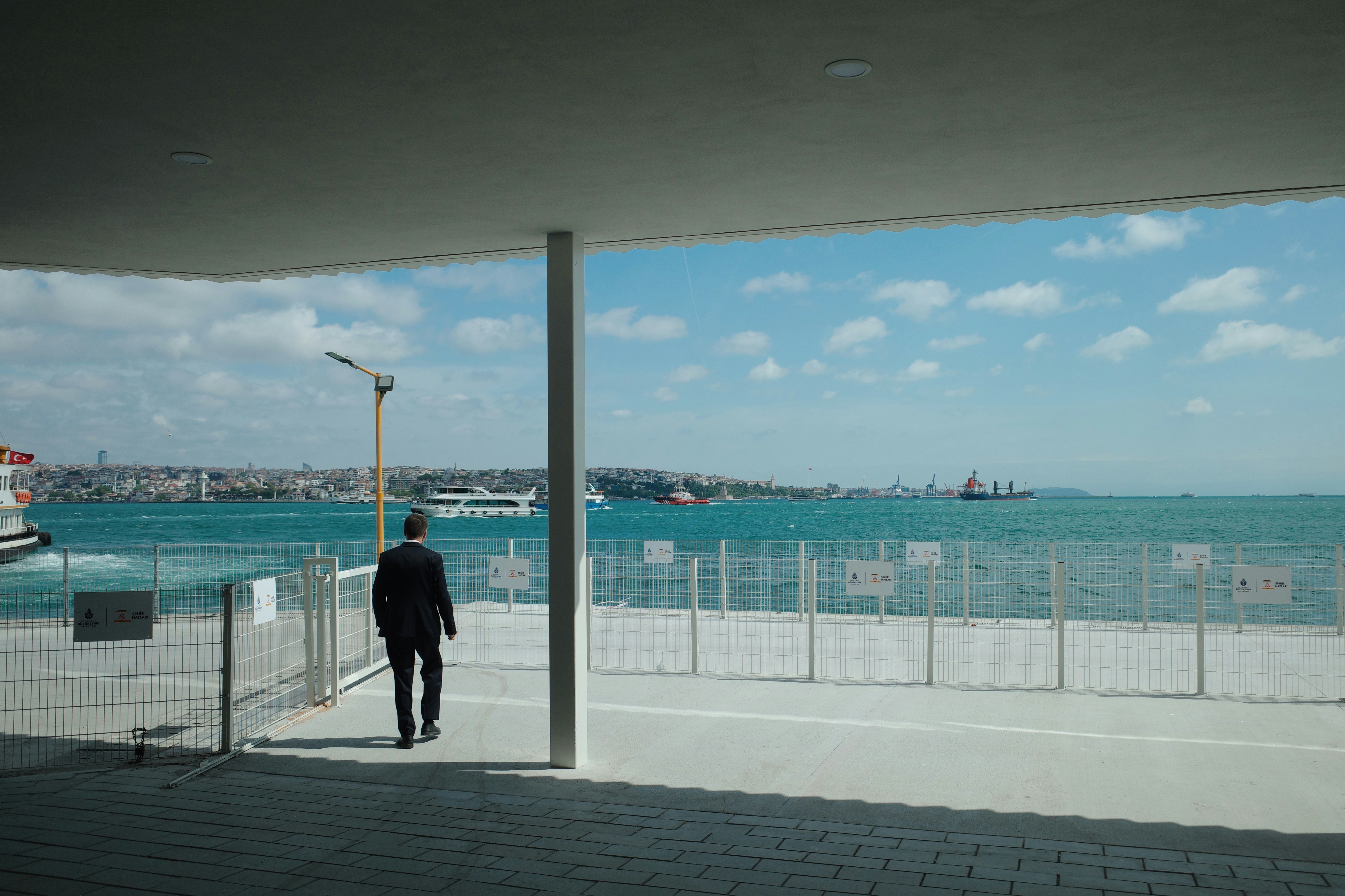 The Lone Observer by the Oceanfront Corridor