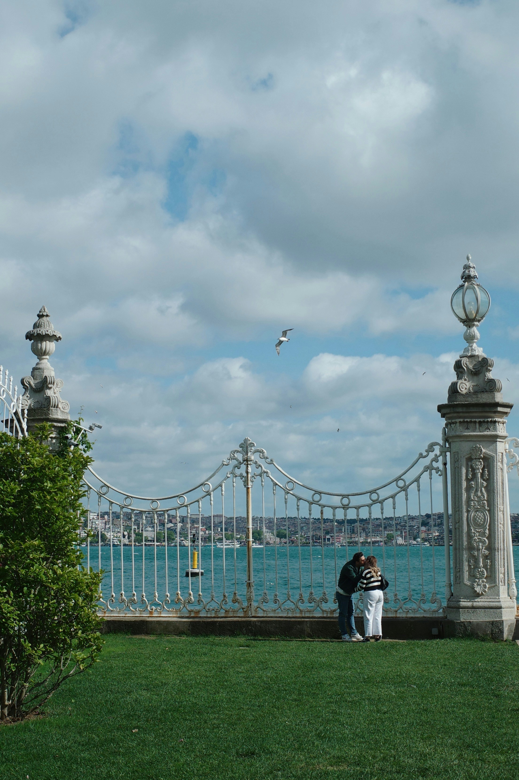A quiet kiss at the gates of the harbor