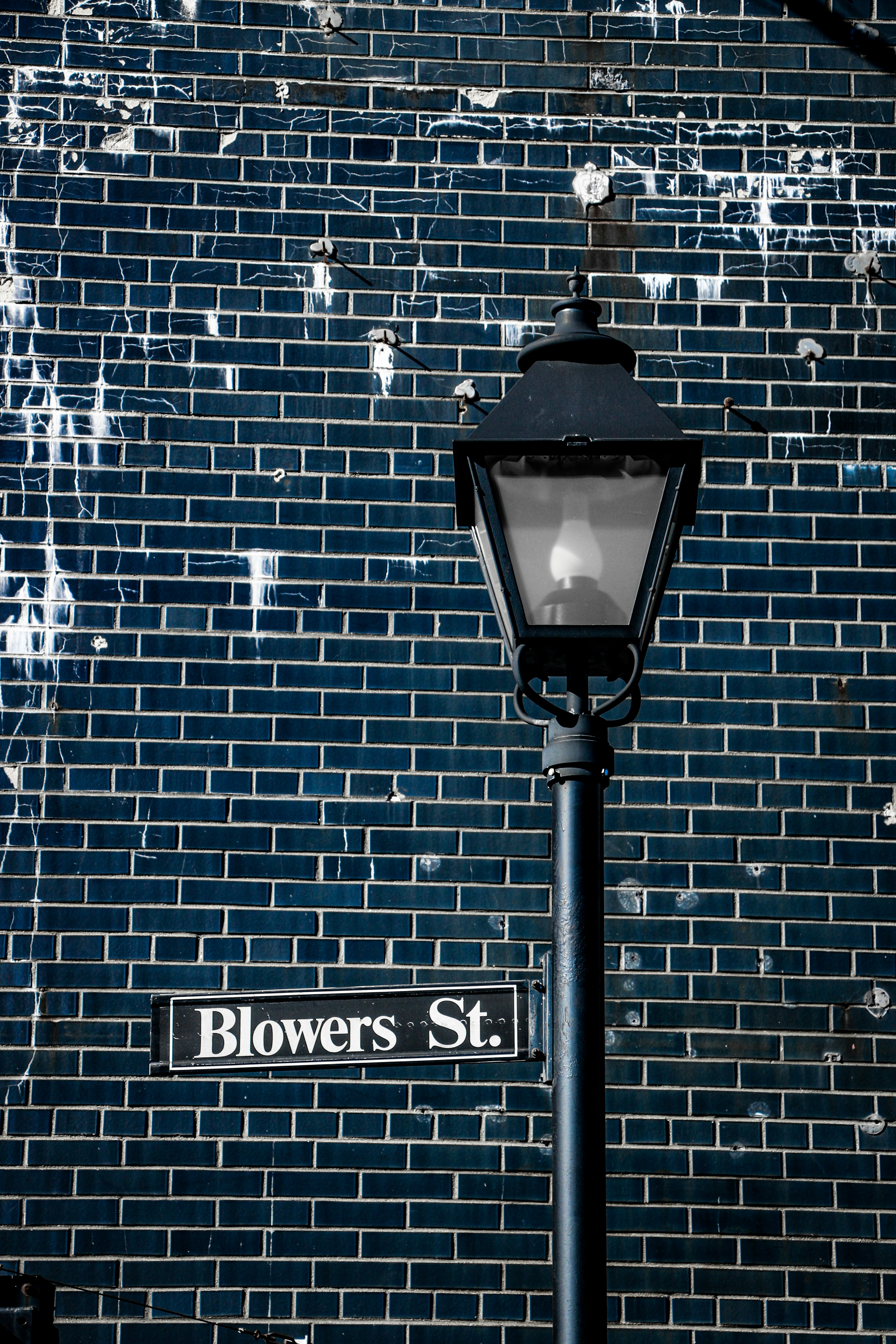 Lamp Post in Blue Brick Wall on Blowers Street