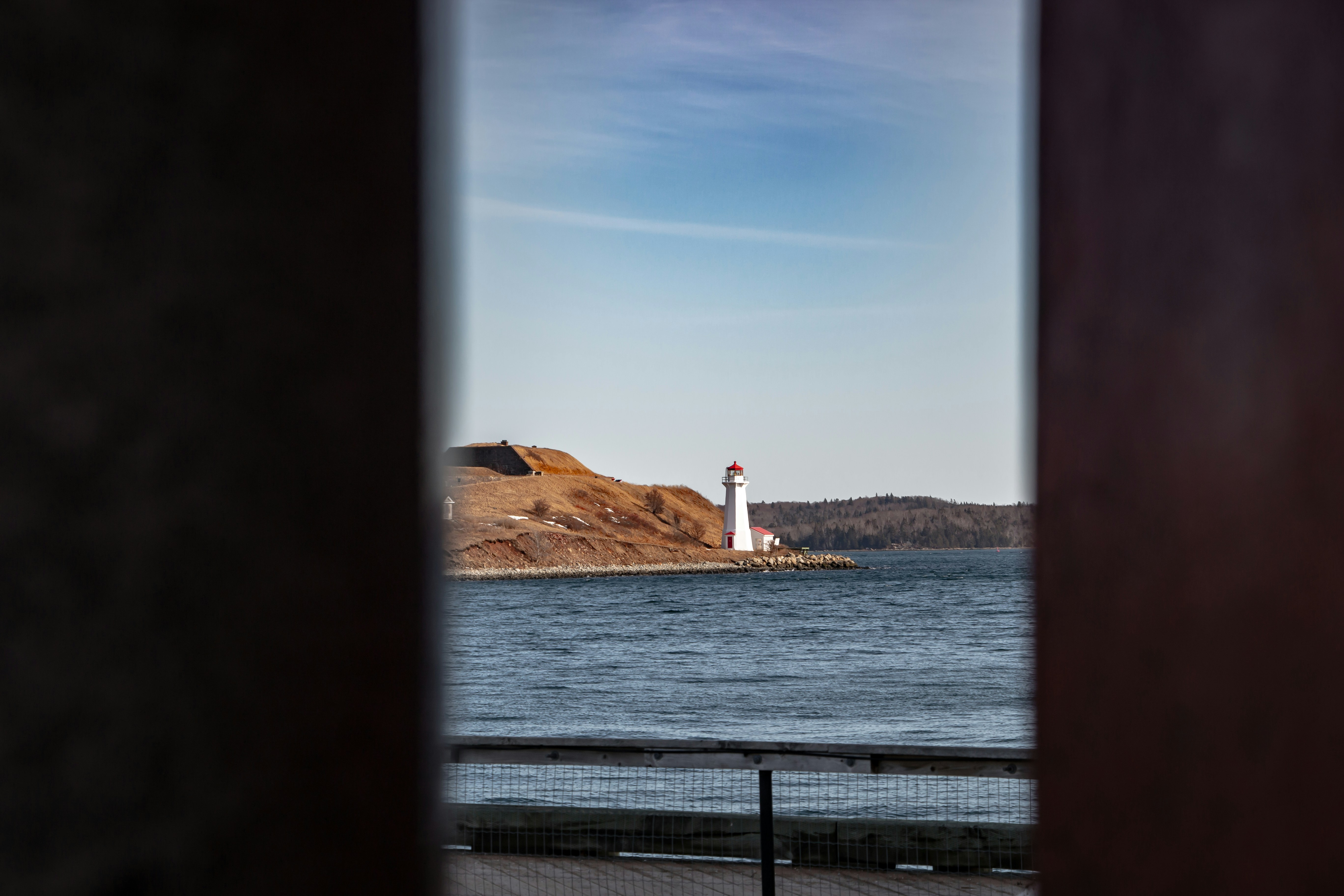 Lighthouse Through a Narrow Frame