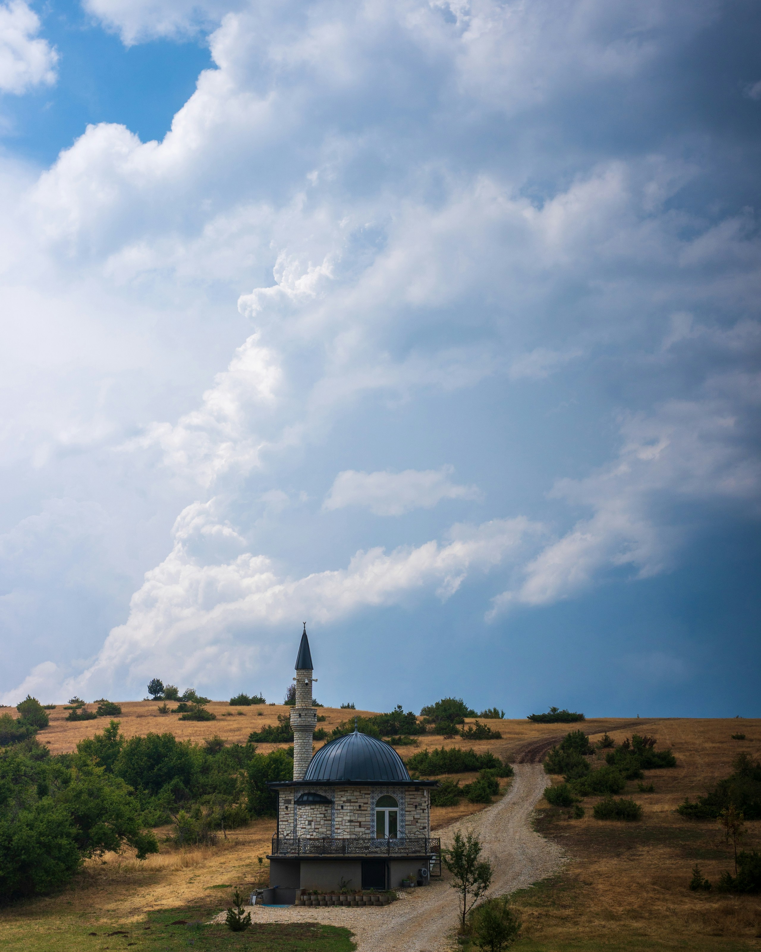 Stone Chapel under a Wide Sky