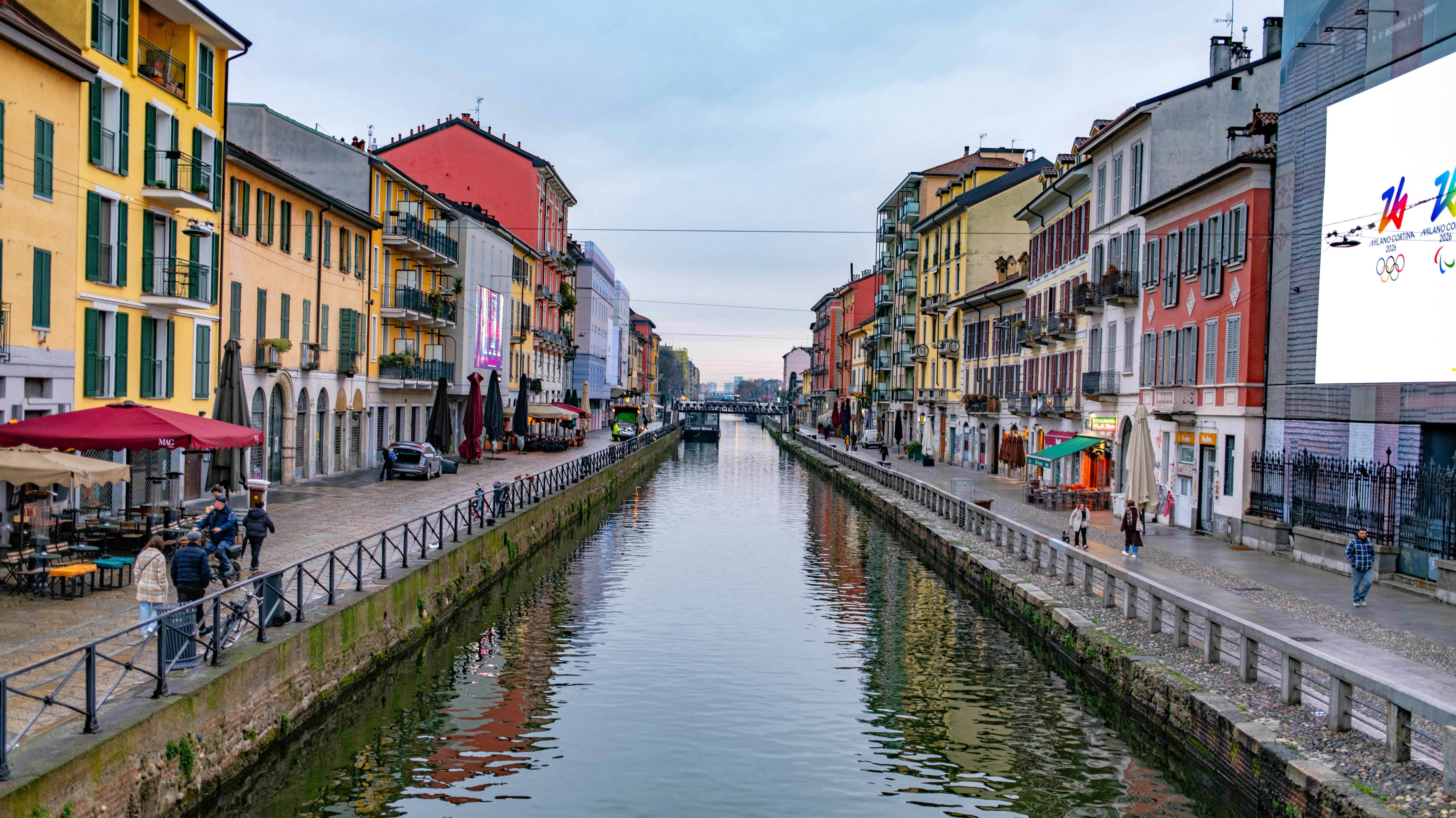 Canal-side Palette: Colorful Italian Street Stretching Along the Water