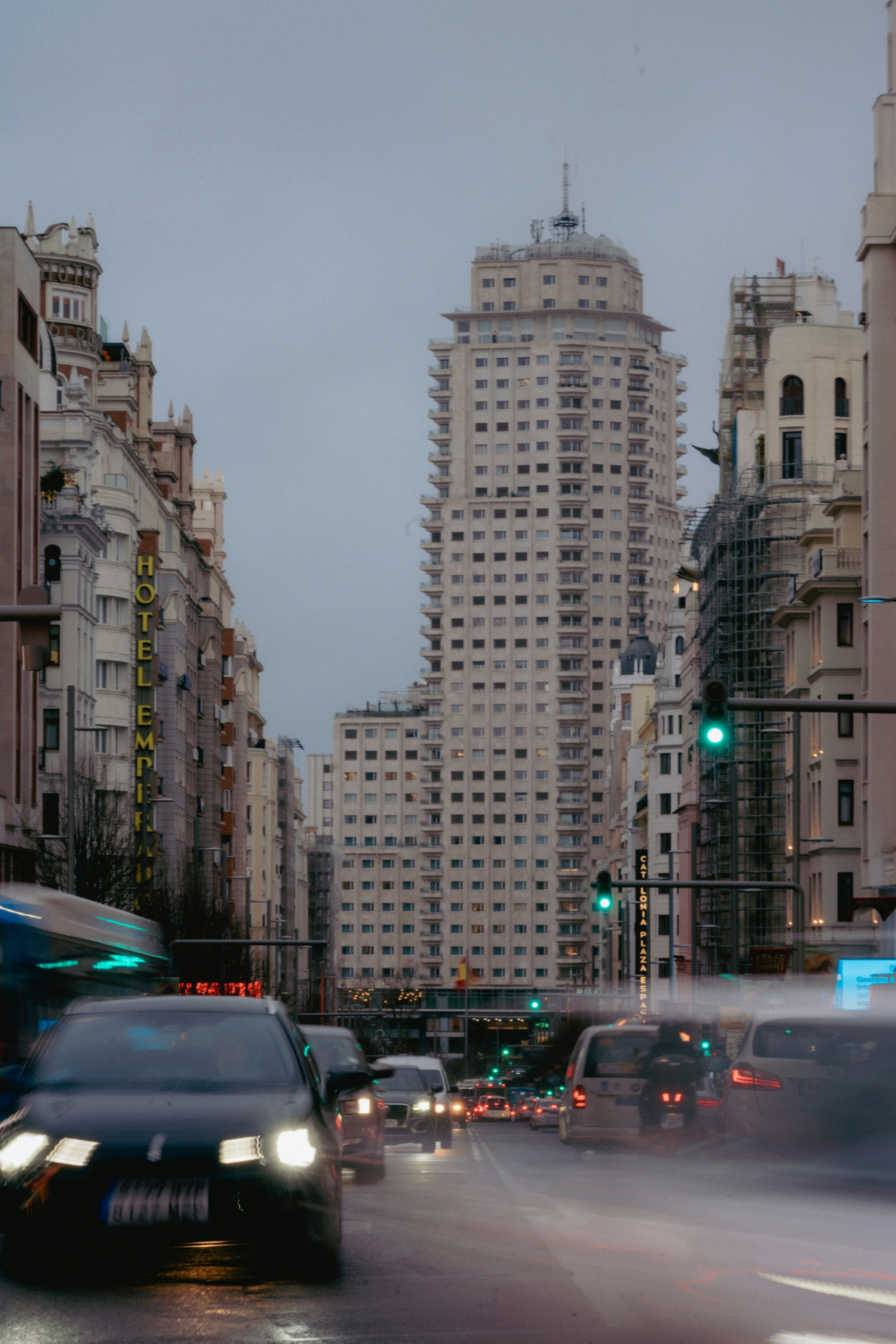 Central Tower Rising Above a Bustling Avenue
