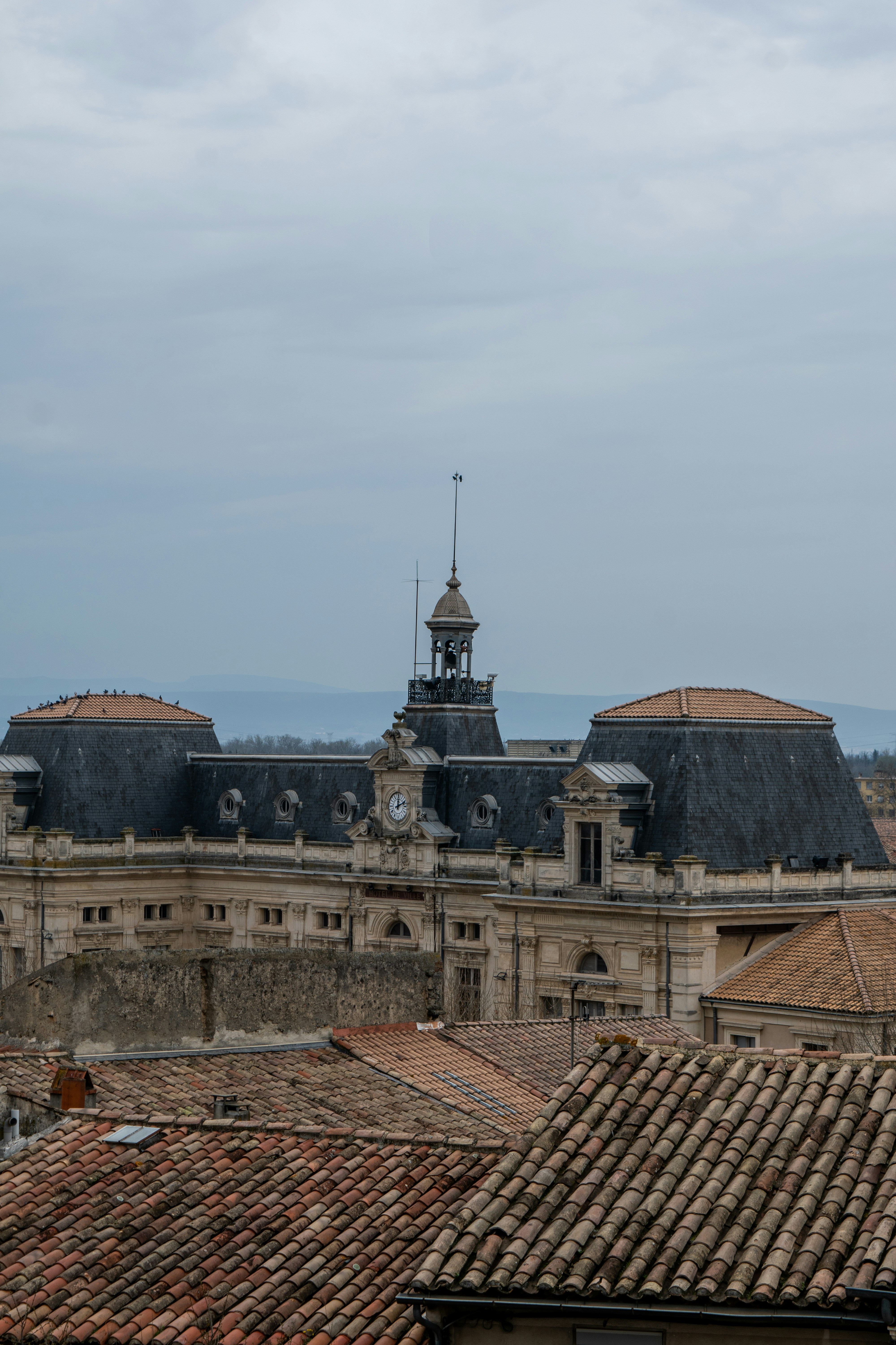 Rooftops and a Clocktower: Quiet Union Over a Historic City