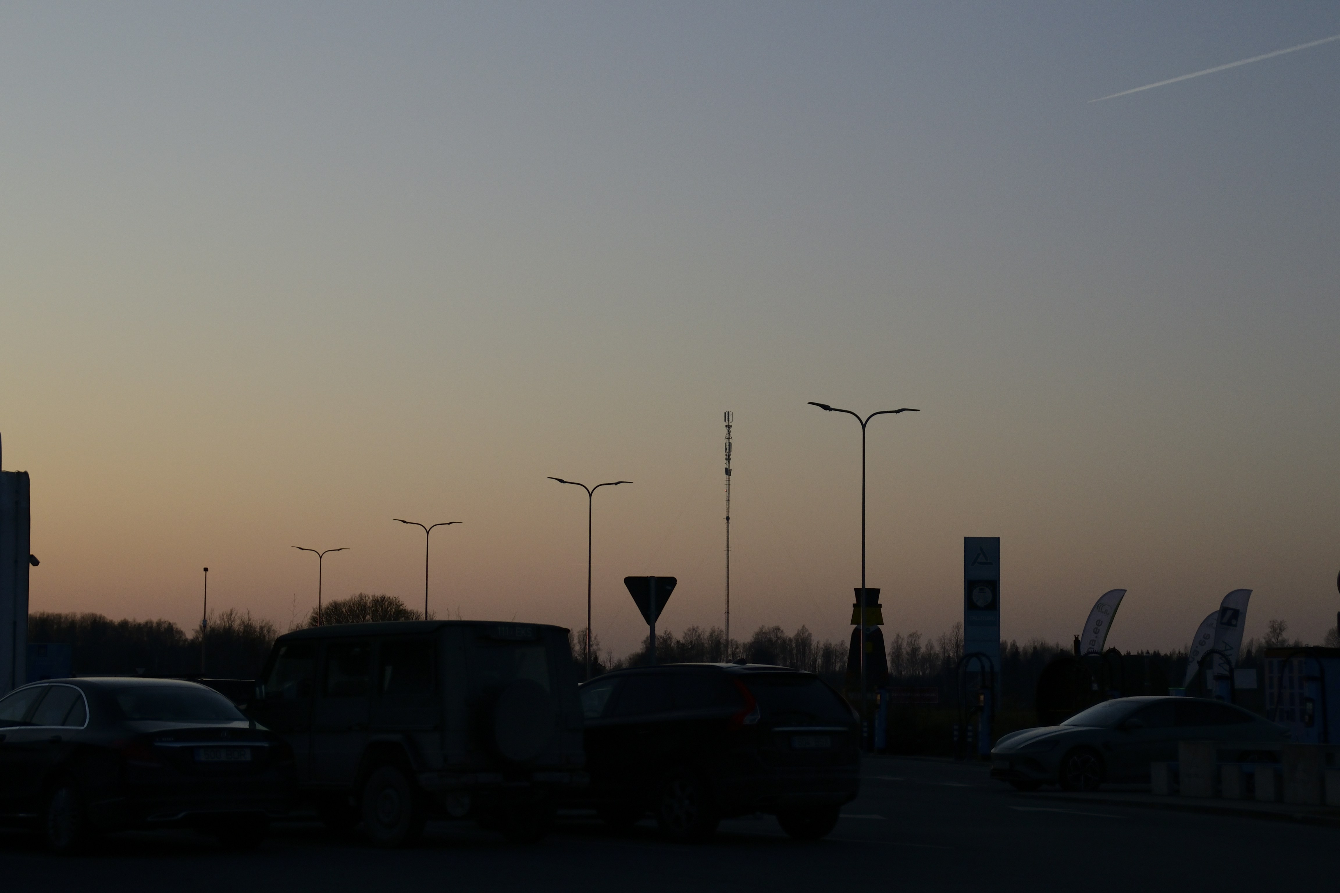 Dusk Silhouette at the Quiet Parking Hub