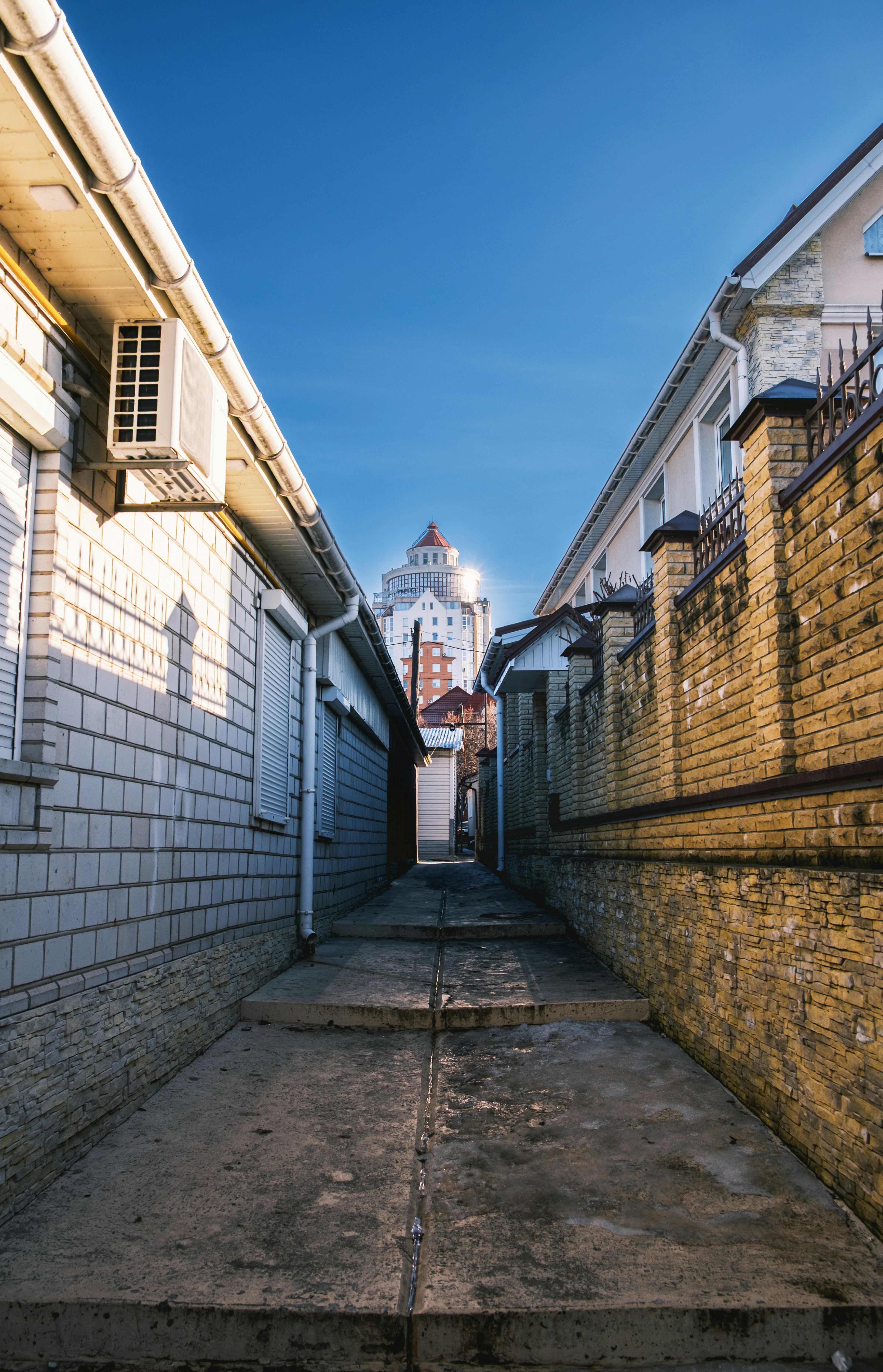Narrow Alley to a Citytower: Light, Lines and Distance