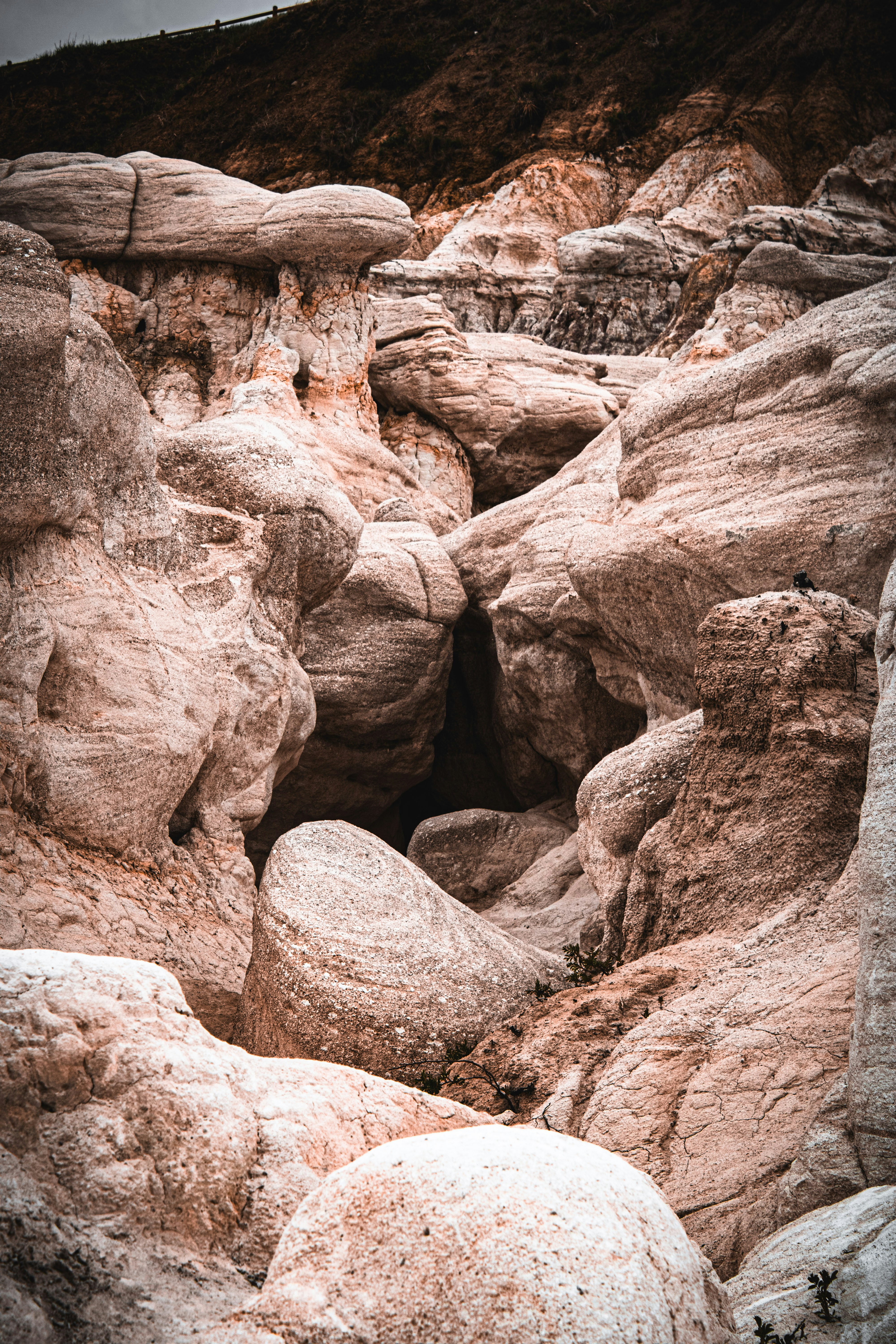 Erosion Gallery: A Corridor of Pink Granite and Shadows
