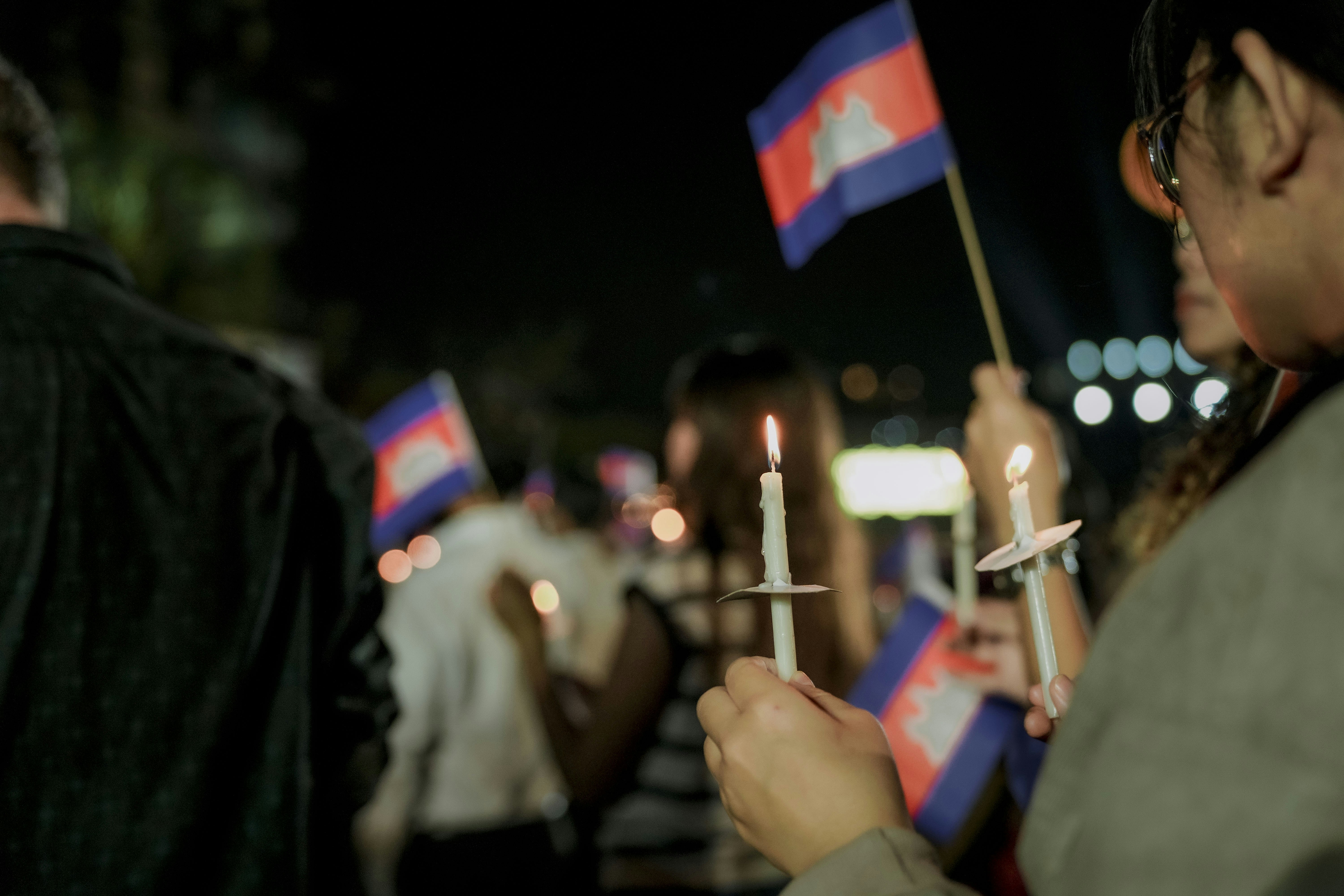 Candlelit Rally: Faces in the Evening Crowd