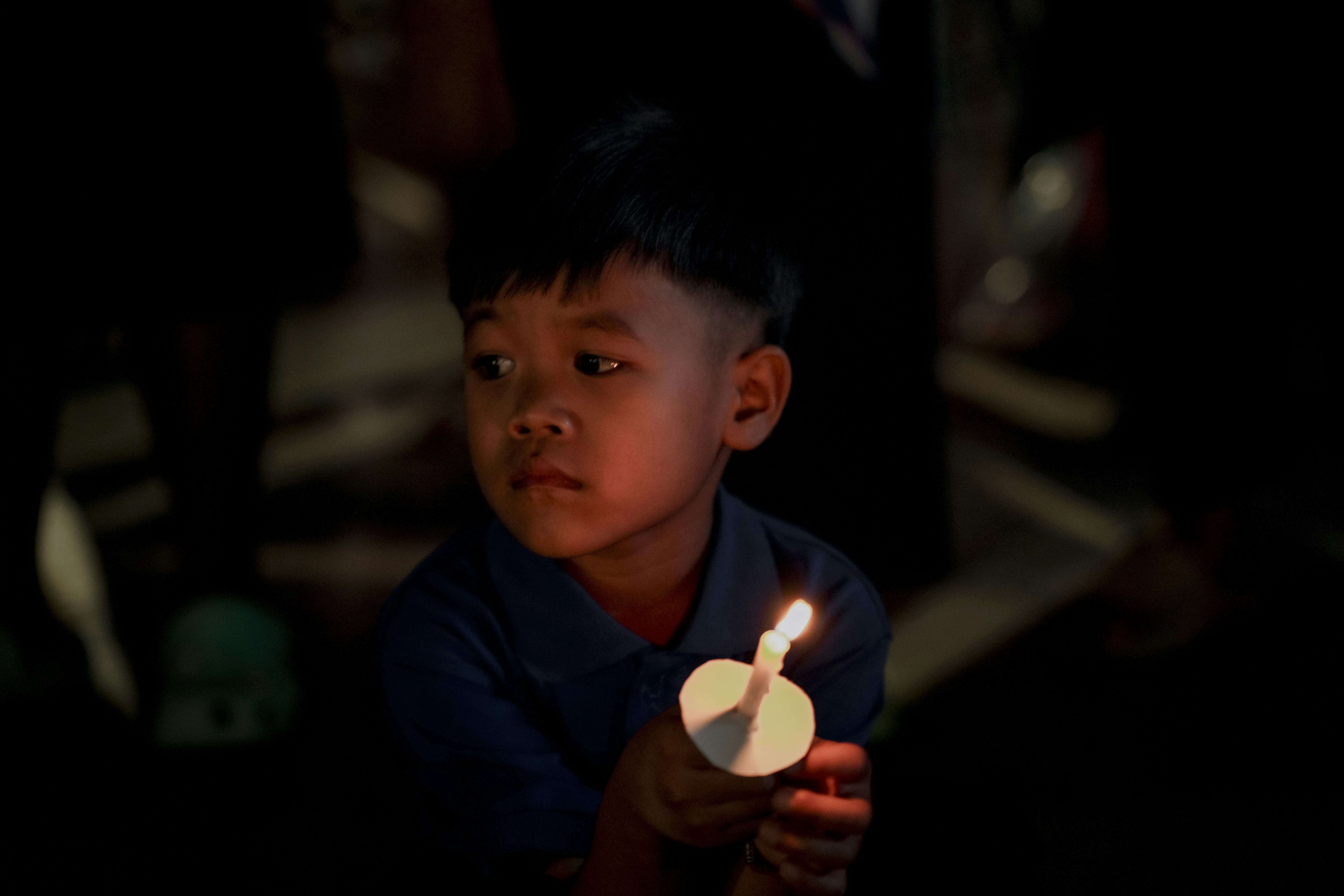 candlelight gaze: a quiet moment in the dark