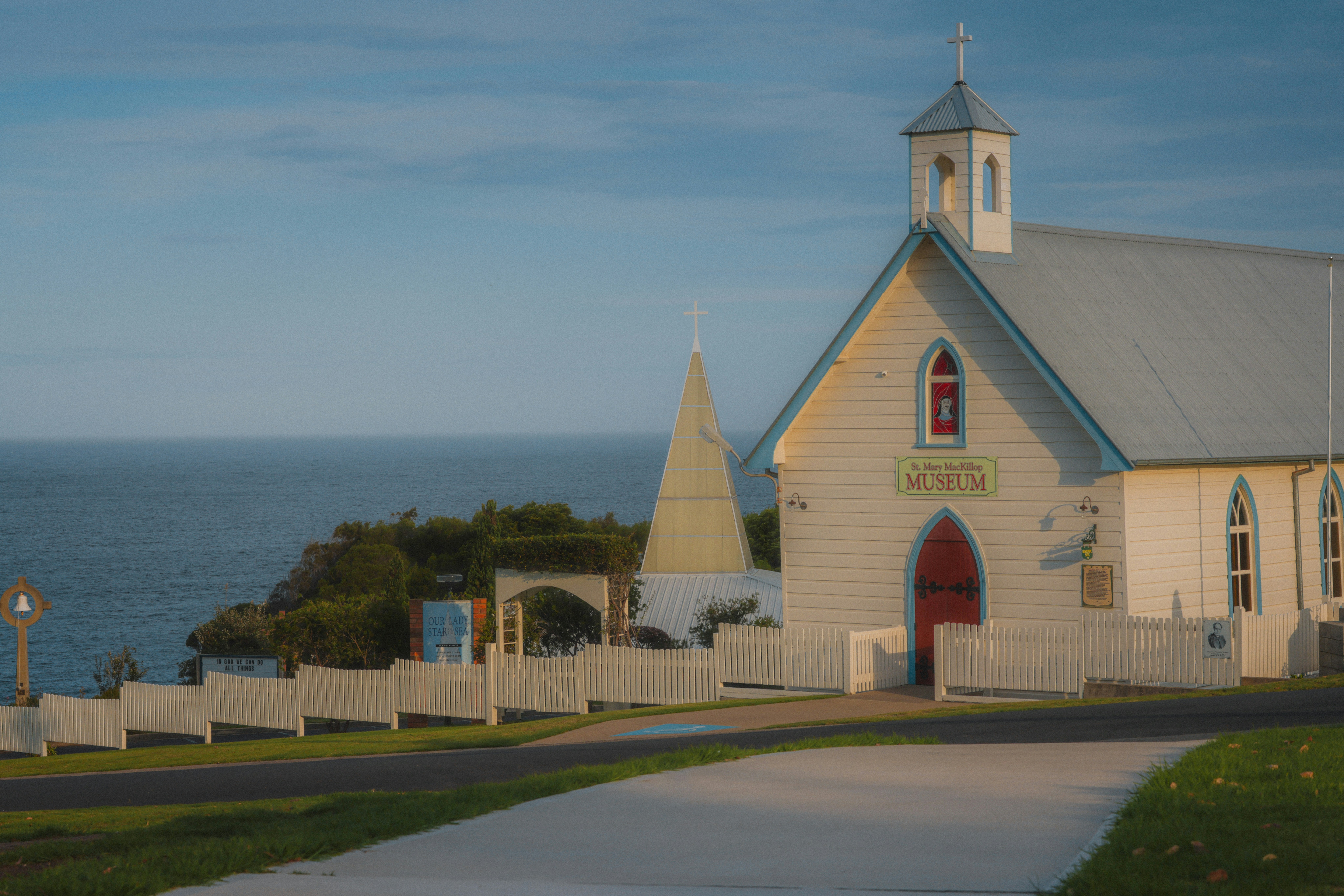 Coastal Chapel at Dusk: A Seaside Church with Ocean Backdrop