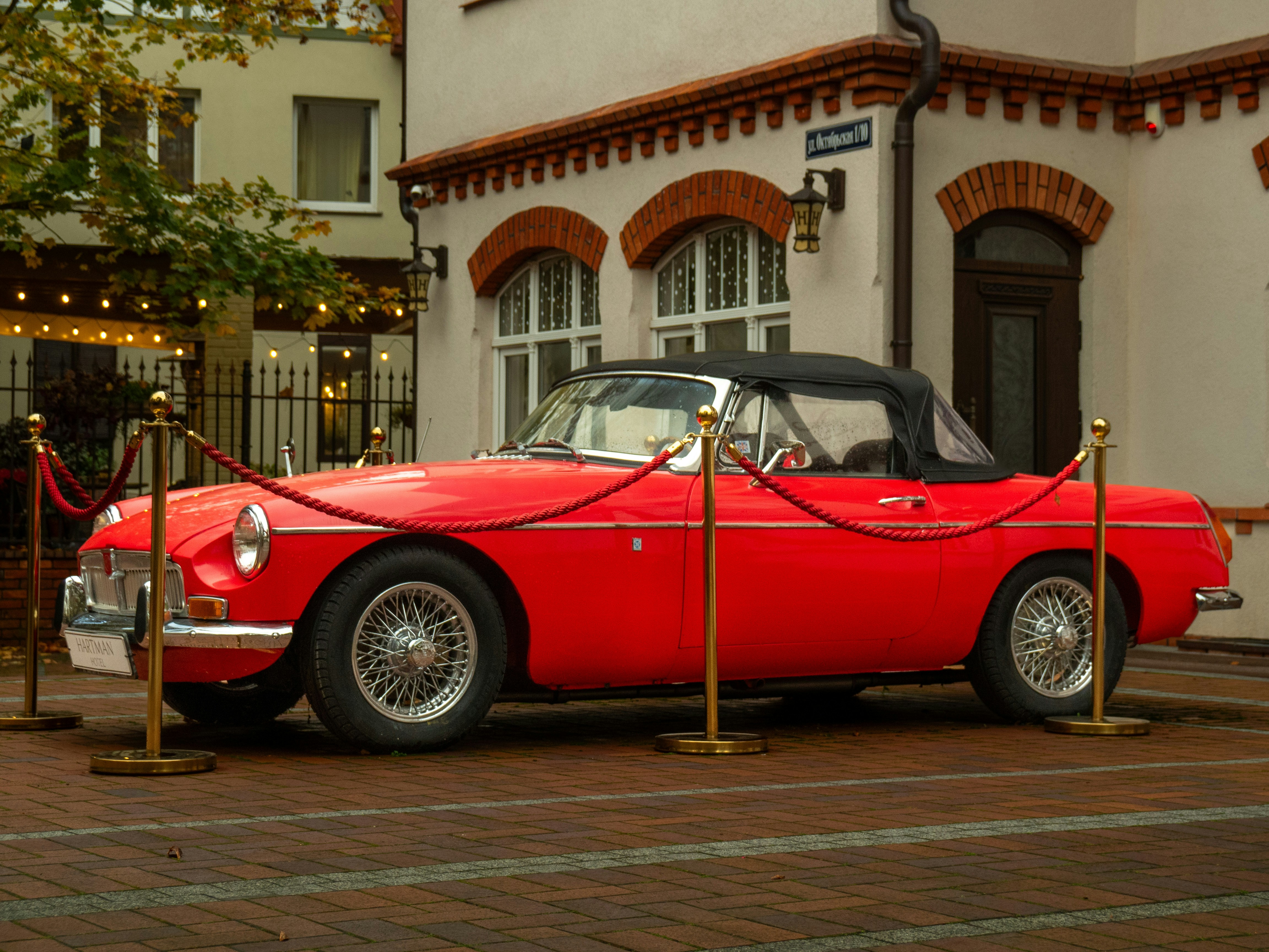 Red Convertible on a Quiet Street Corner