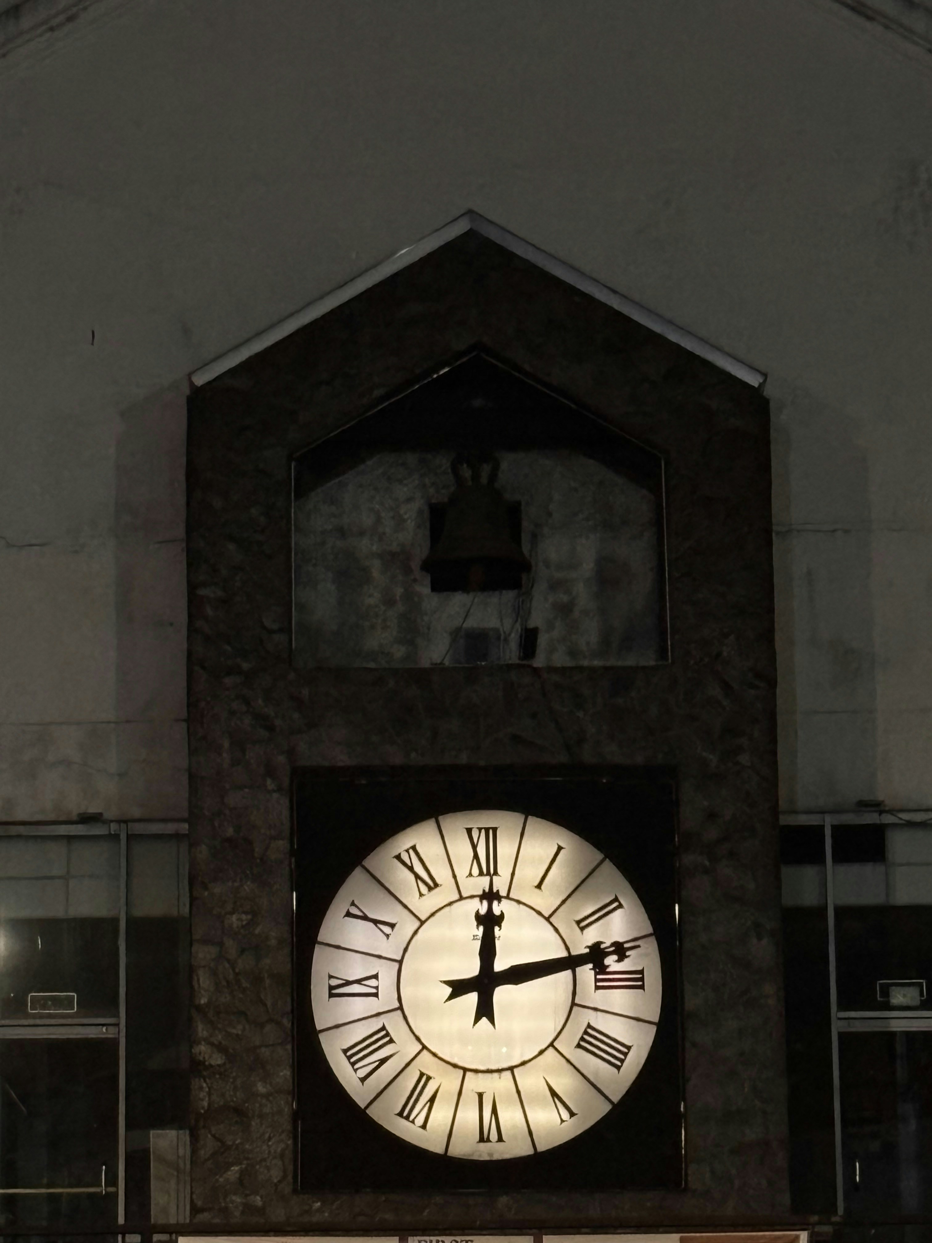 Midnight Bell: An Old Clock Tower Awash in Dim Light