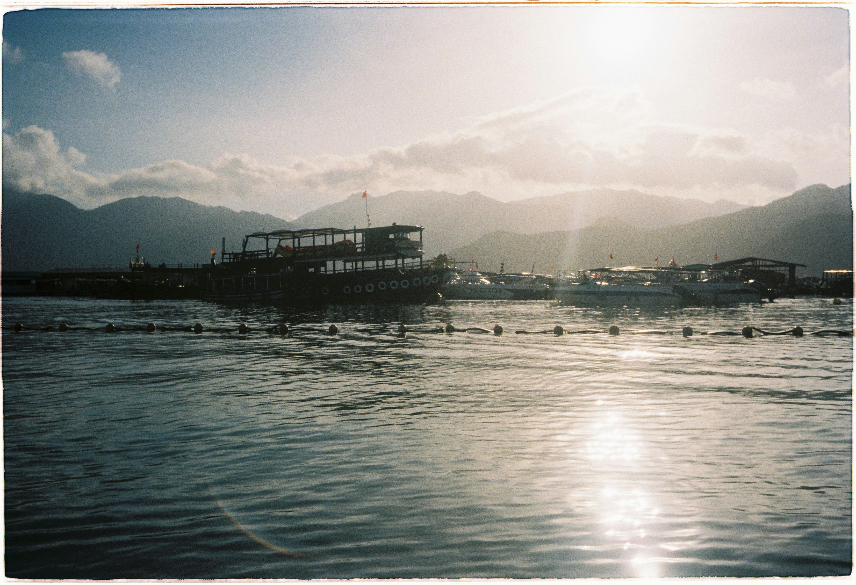 Sunlit Harbor Boat Paddock at Dusk
