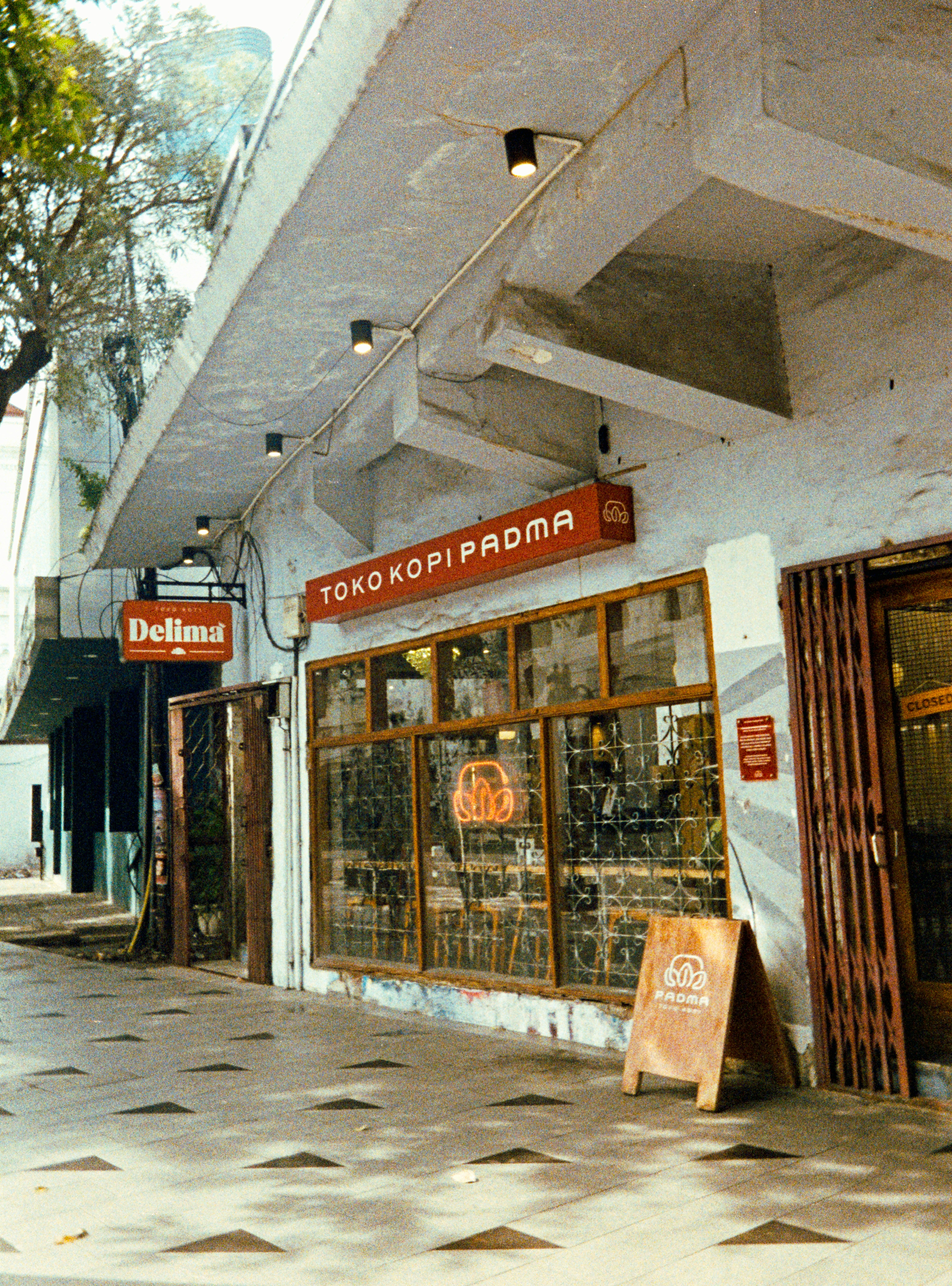 Street Level Café Signage under Overhang
