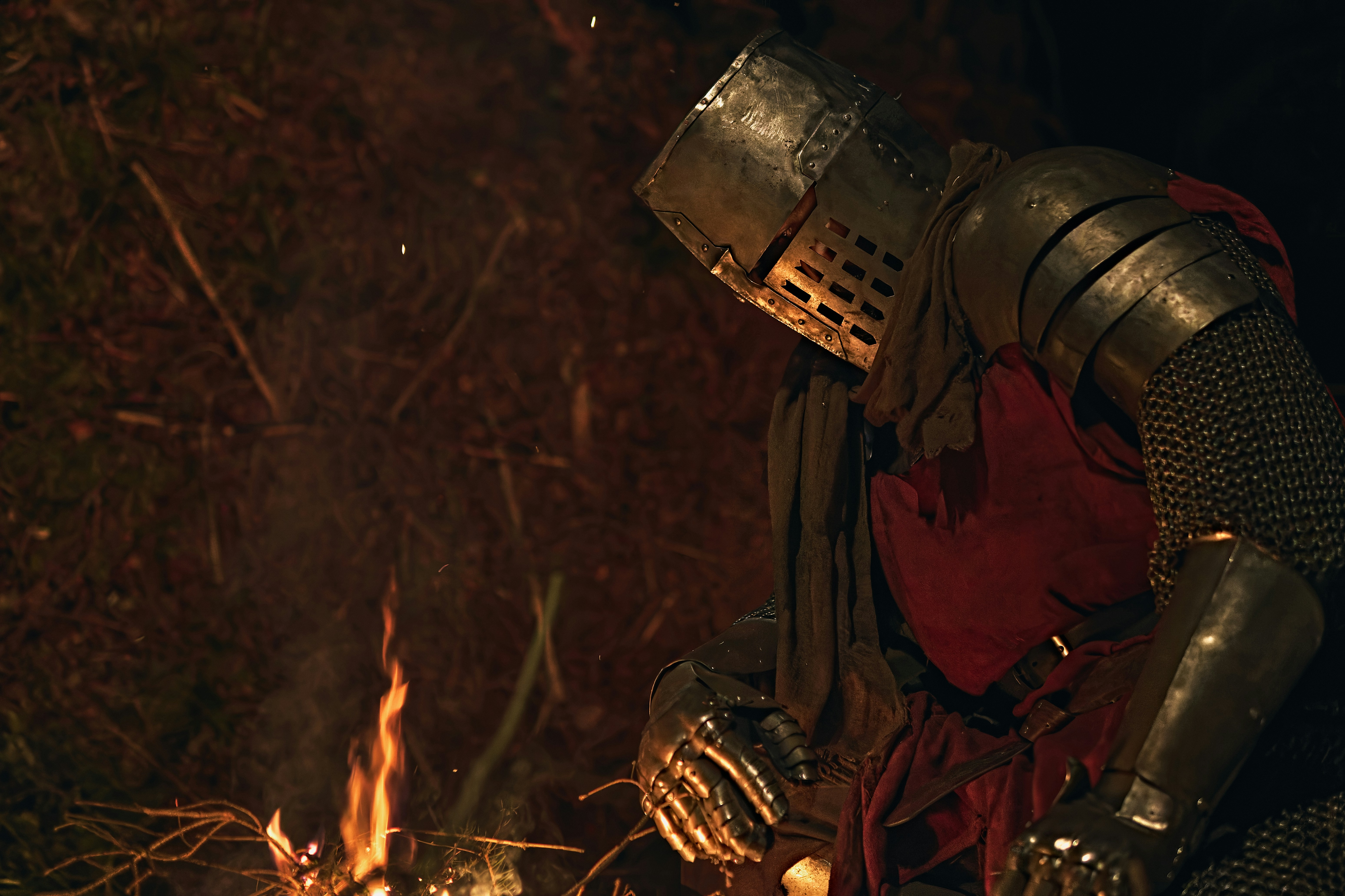 Knight at Dying Ember: A Medieval Sentinel Beneath Torchlight