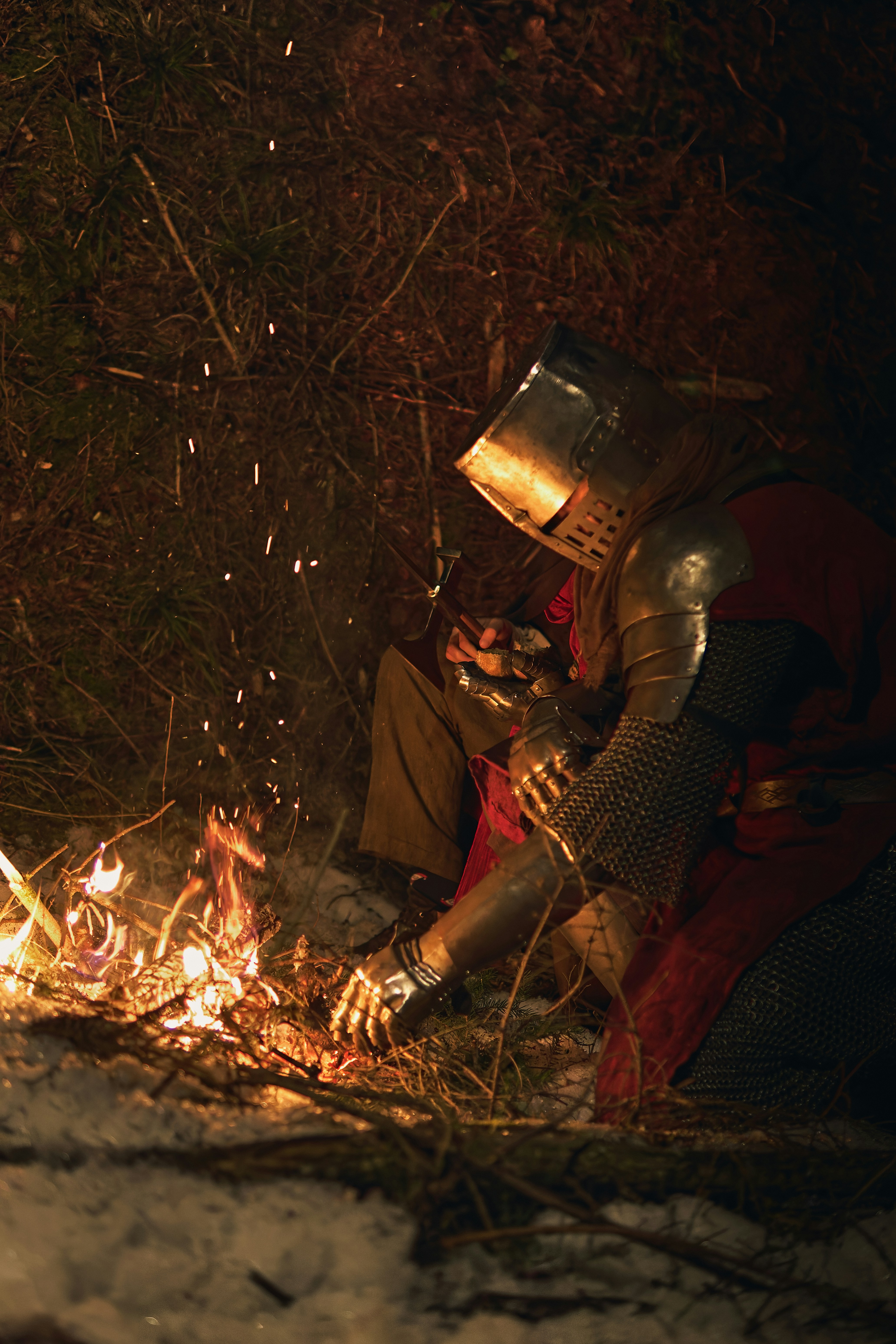 Knight in Nightfire: A Metal-clad Figure by the embers
