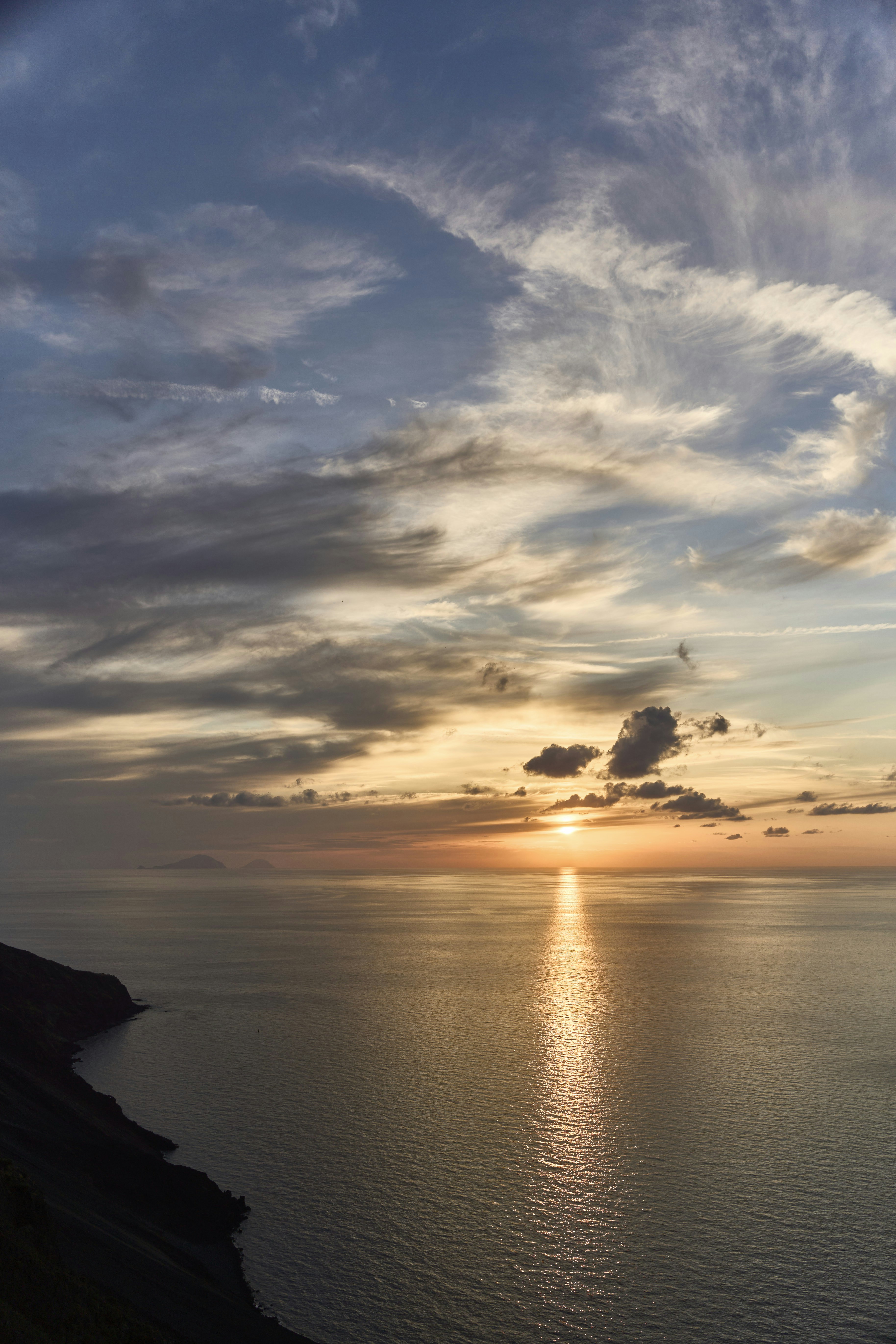 Sunlit Horizon: A Quiet Sea at Dusk
