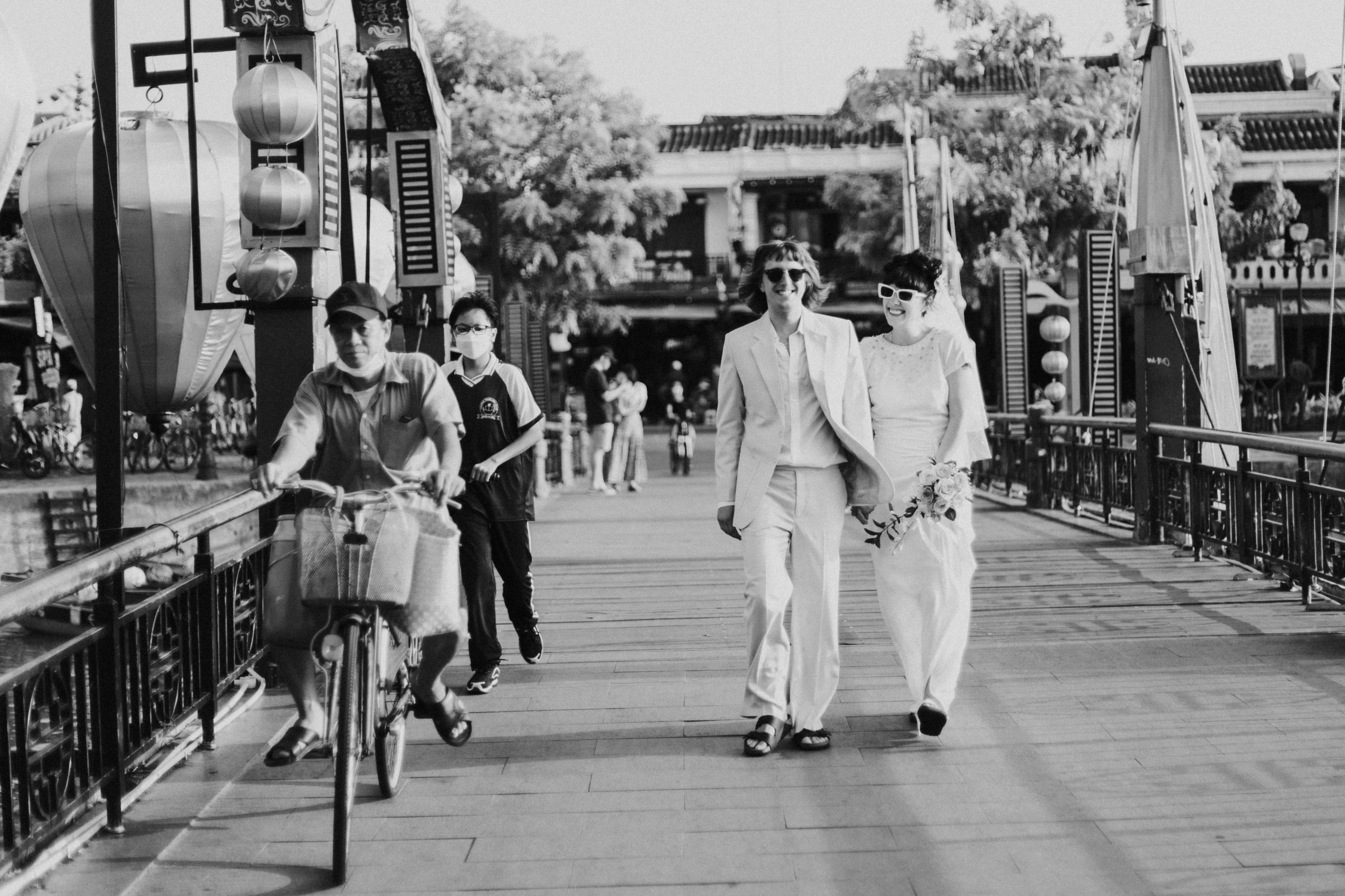 Strolling couple on a sunlit promenade