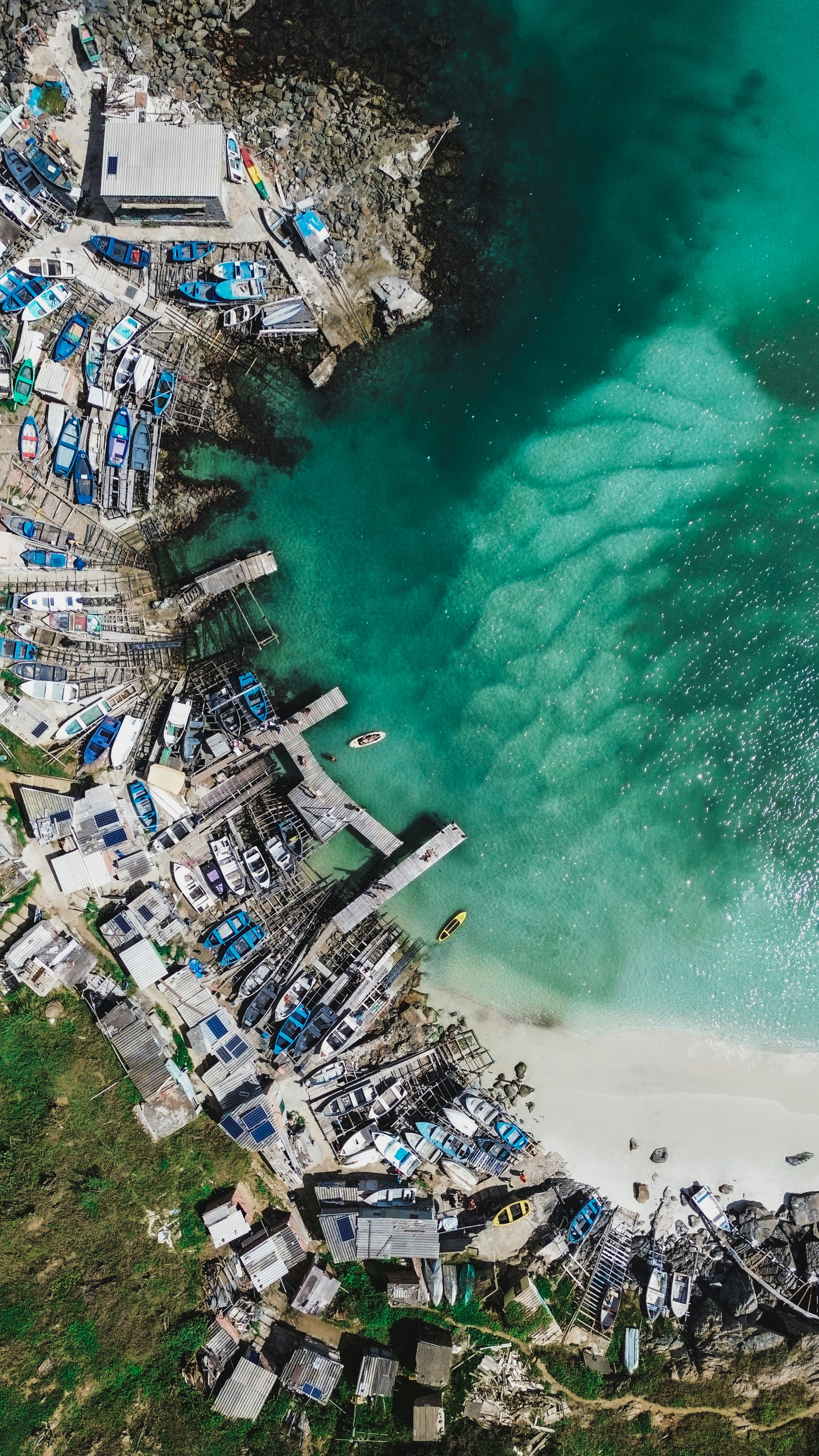 Harbor of Tiny Boats: Aerial Cascade into Turquoise Silence