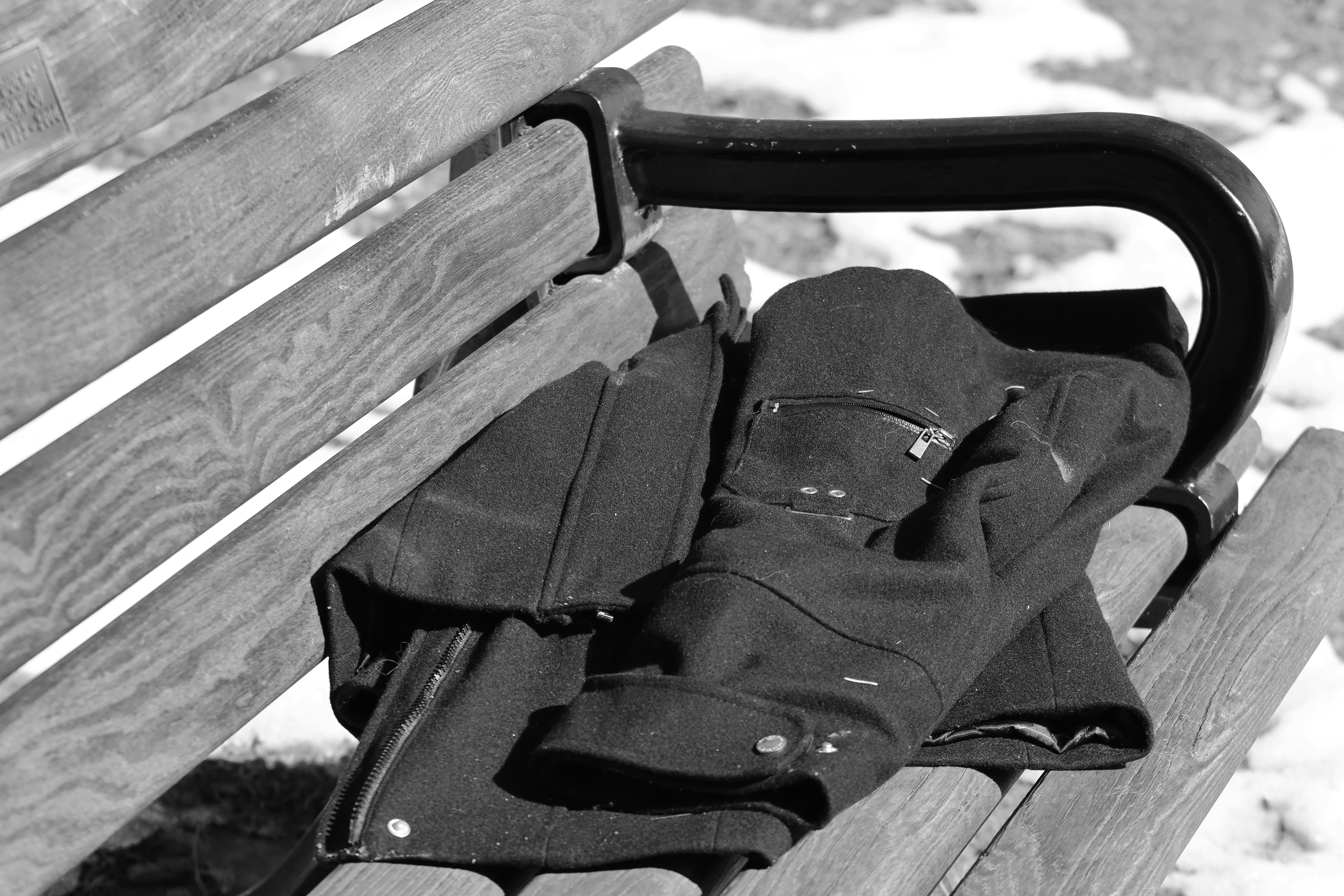 Lonely Coat on a Winter Bench