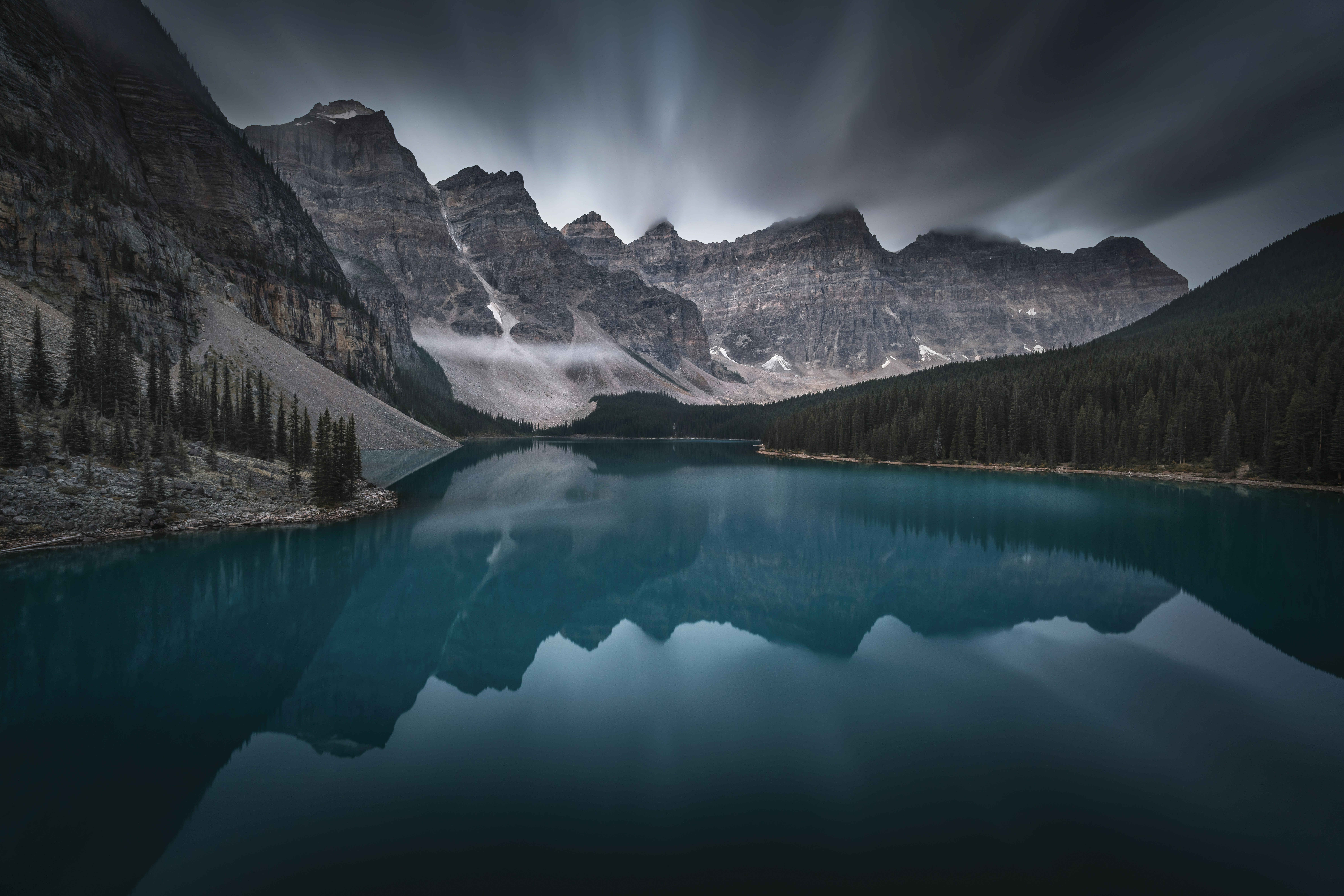 Glacial Mirror: Mountain Ring and Teal Lake in a Silent Hour