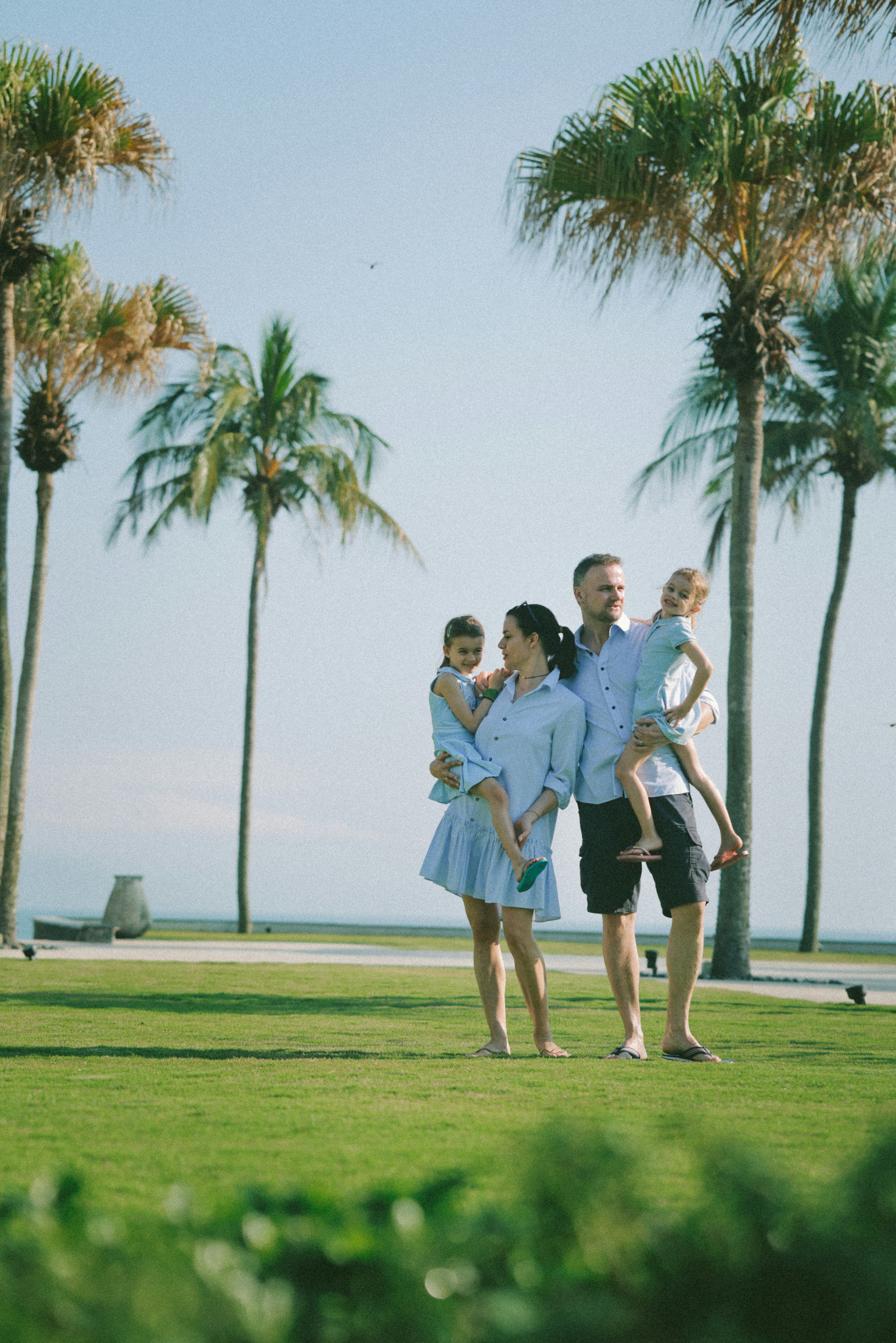 Coastal Family Portrait under Palm Shade
