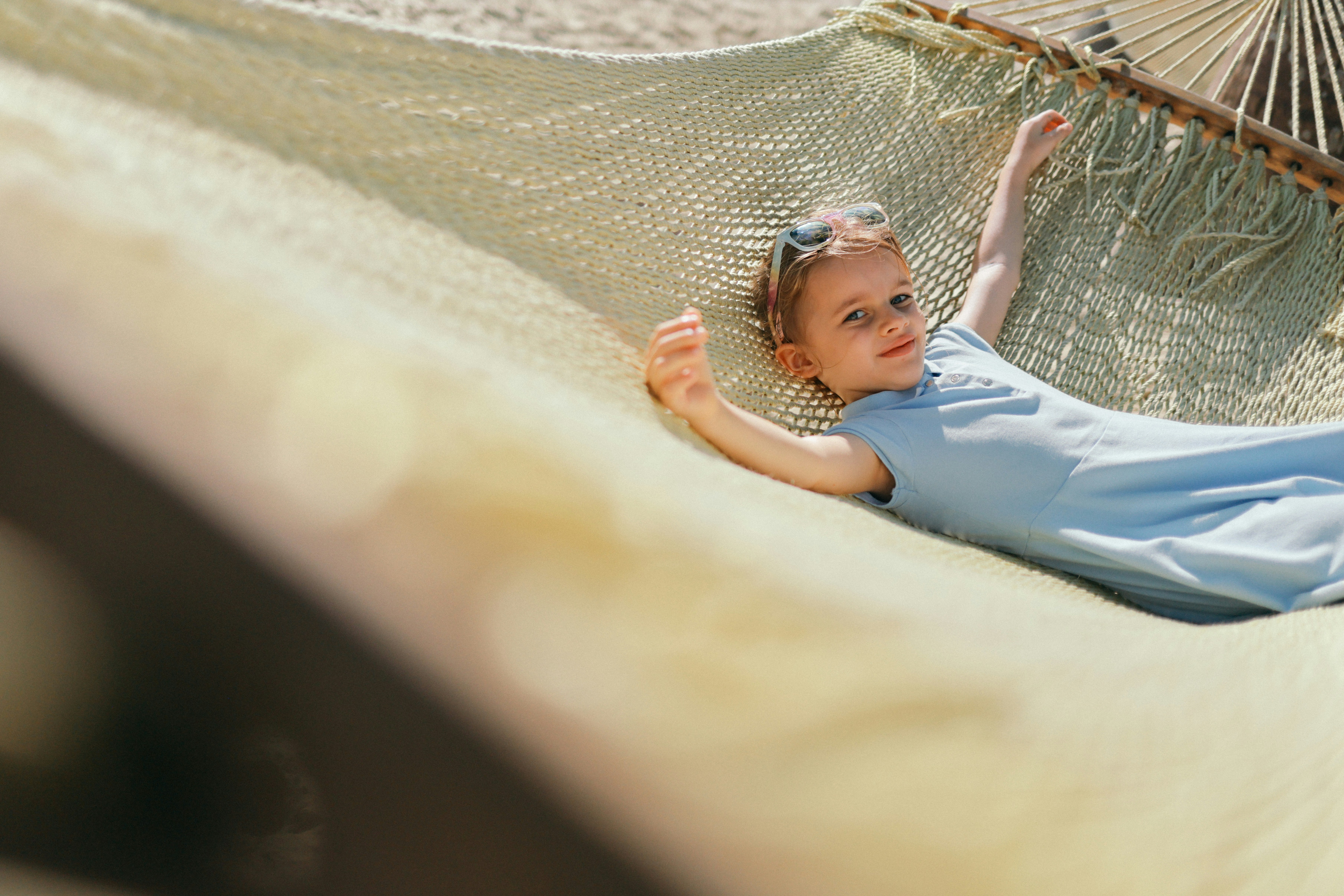 Relaxed in a Hammock: Sunlit Daydream of a Girl