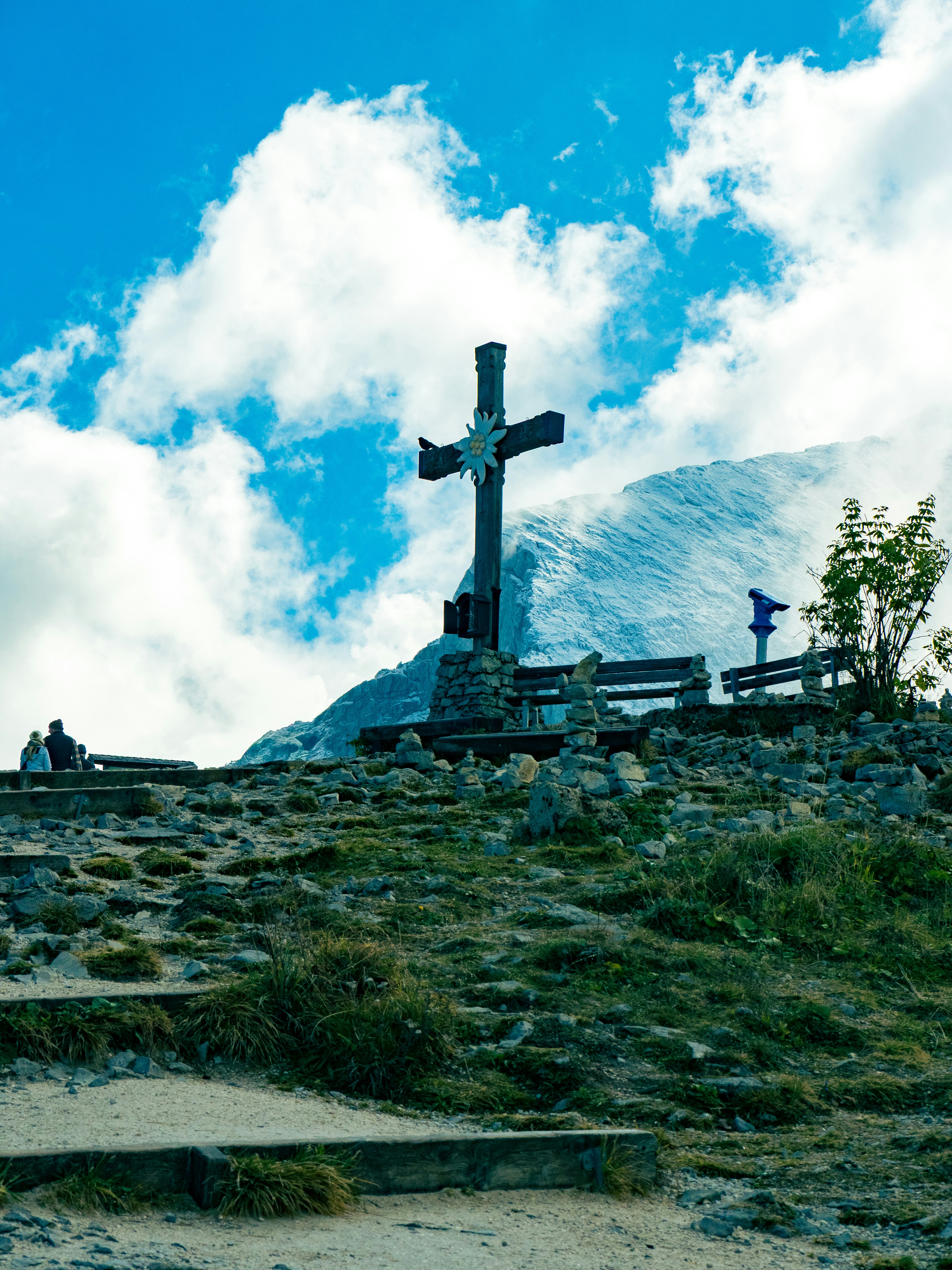 Hilltop Cross Under Bright Sky