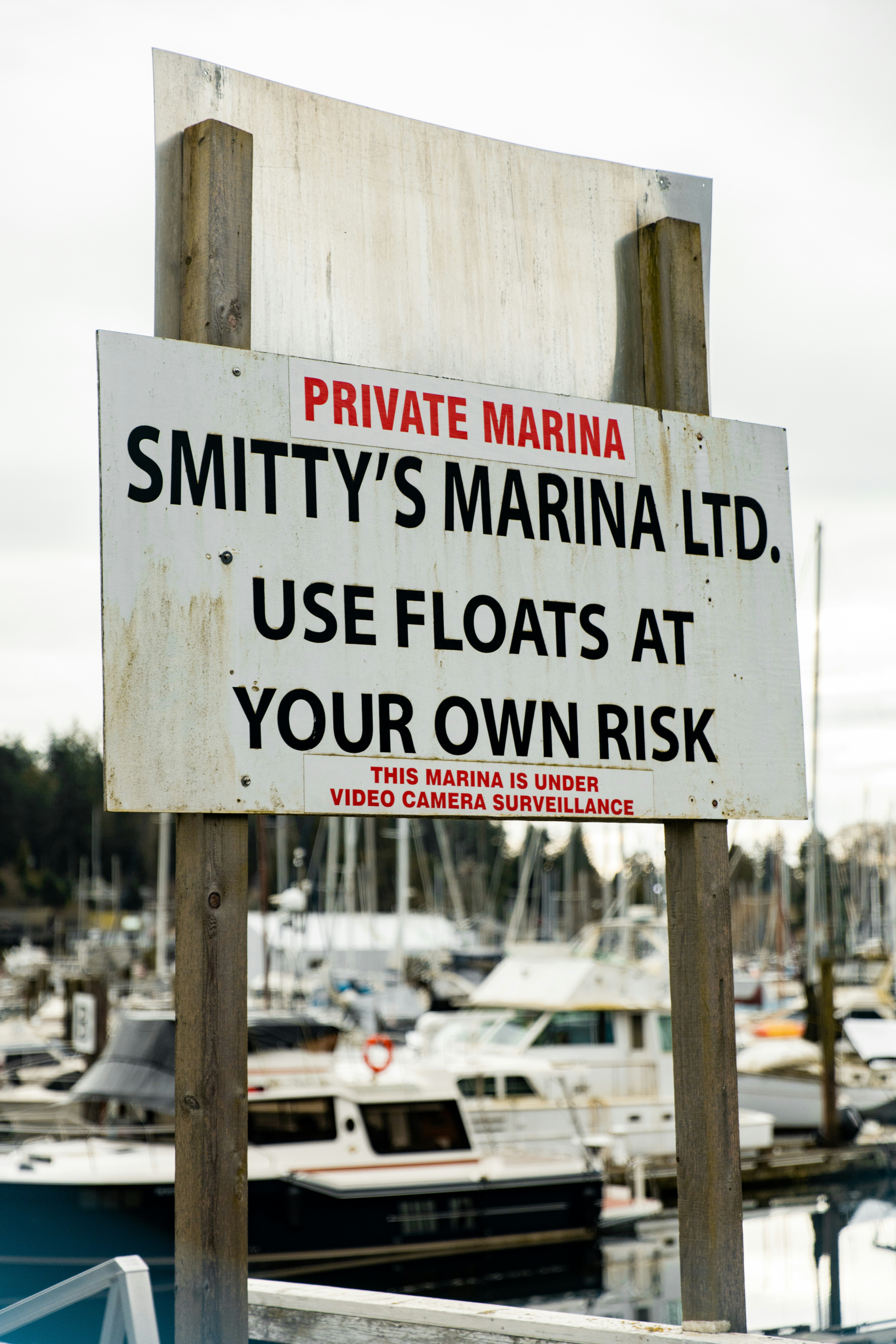 Marina Sign Presiding Over the Quiet Docks