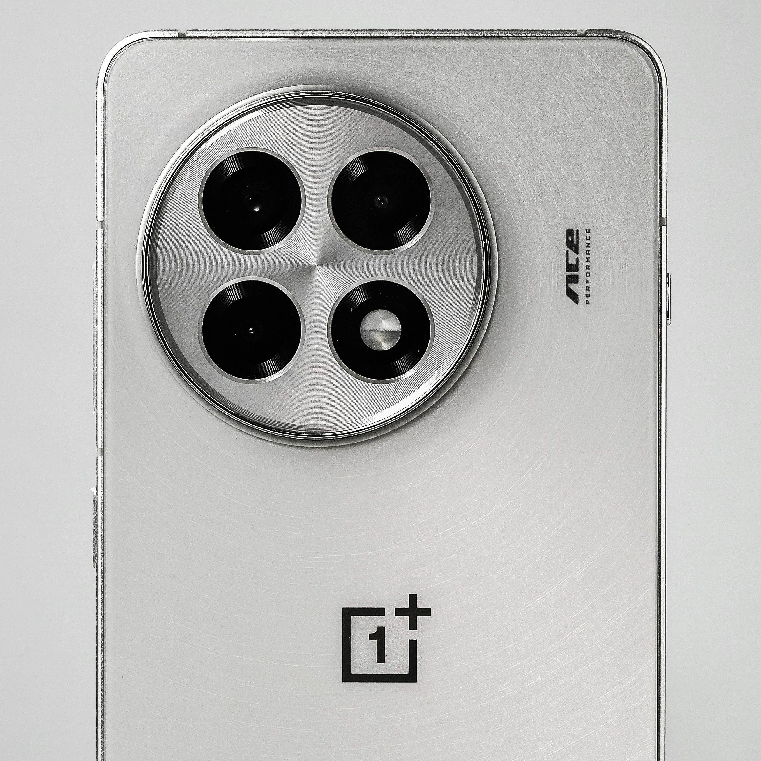 Sleek Silver OnePlus Smartphone Back—Quad Camera Array Centered in a Minimal Frame