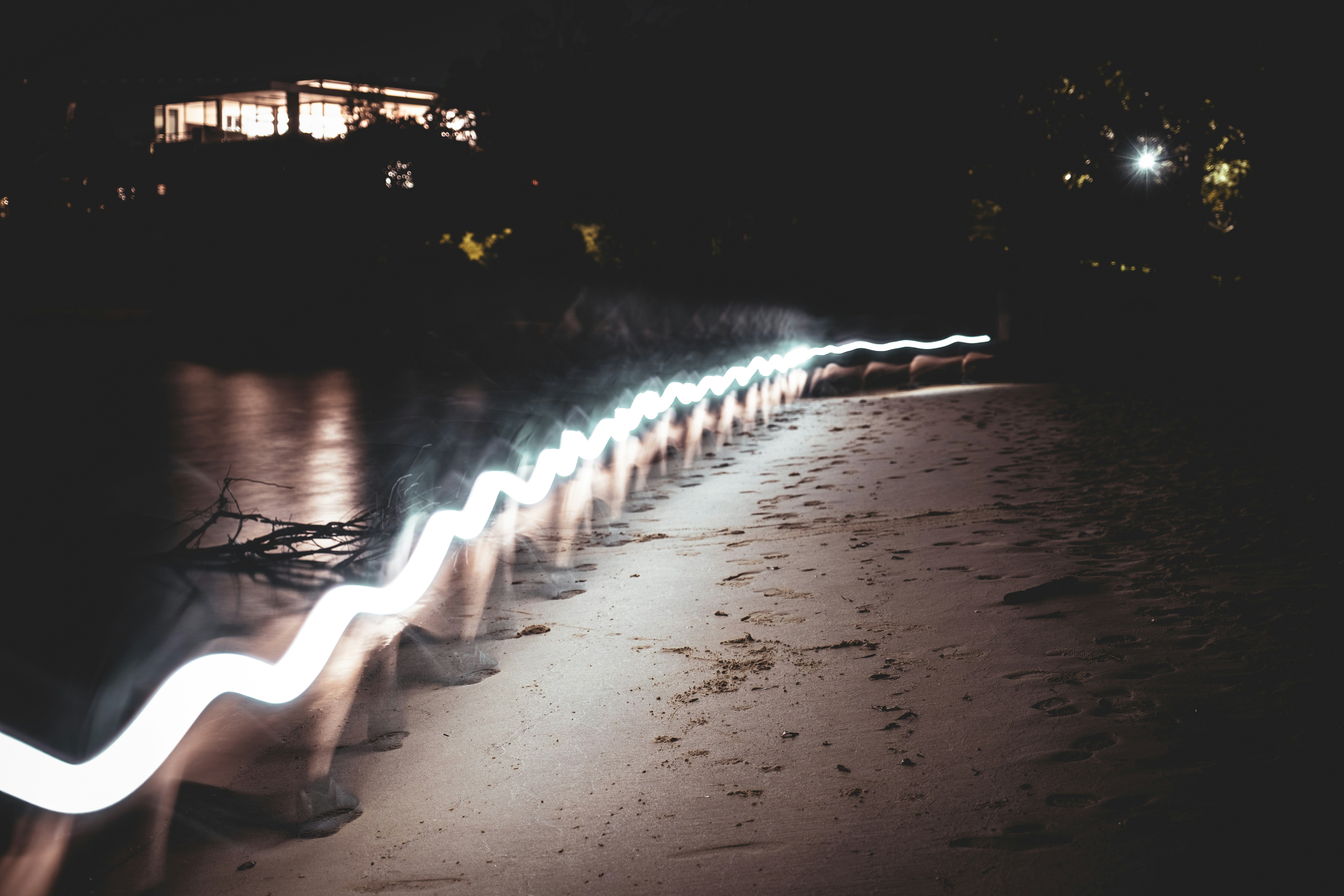 Luminous Boardwalk: A Night Drift Along the Waterline