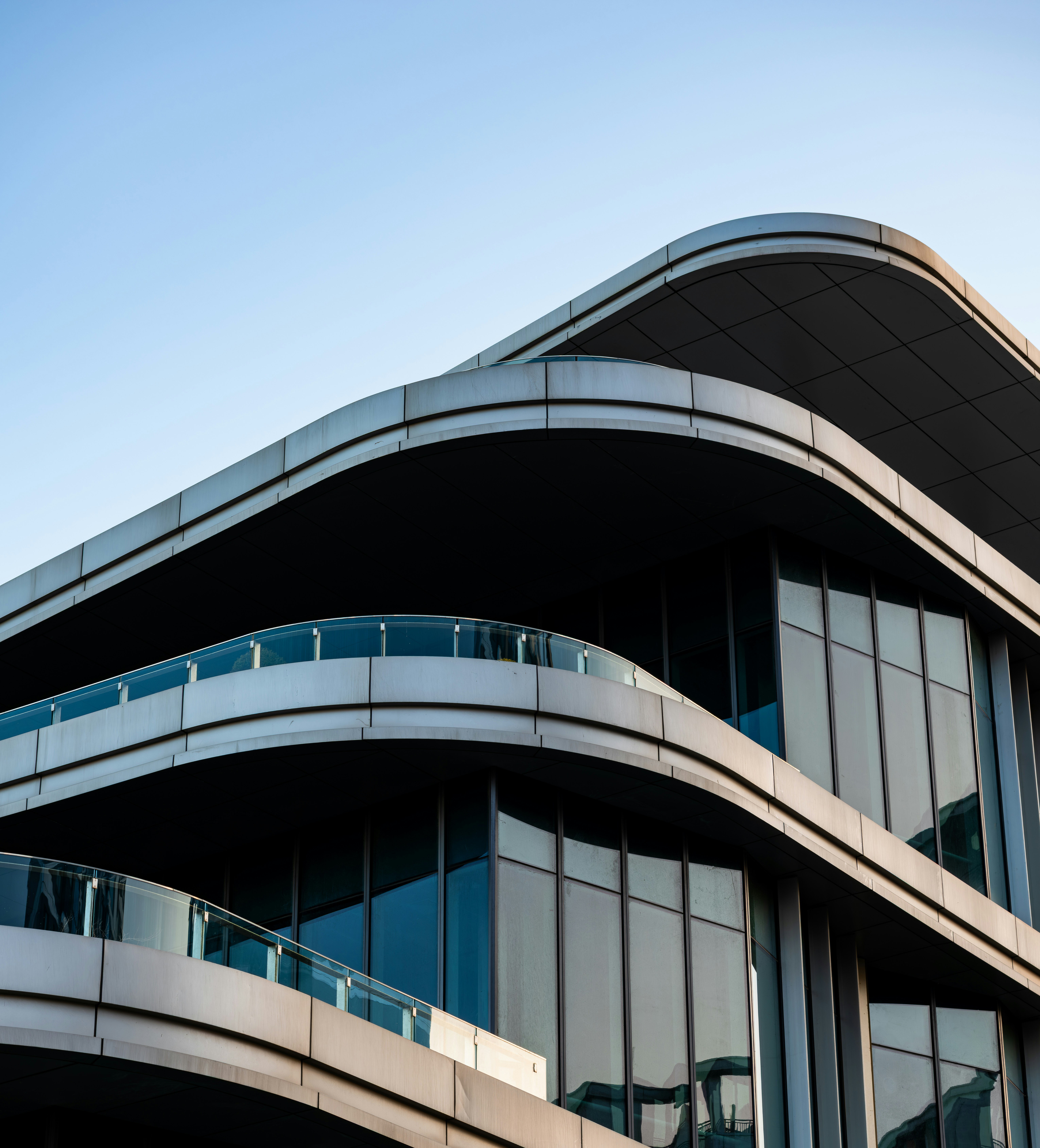 Modern building with curved architecture and glass windows