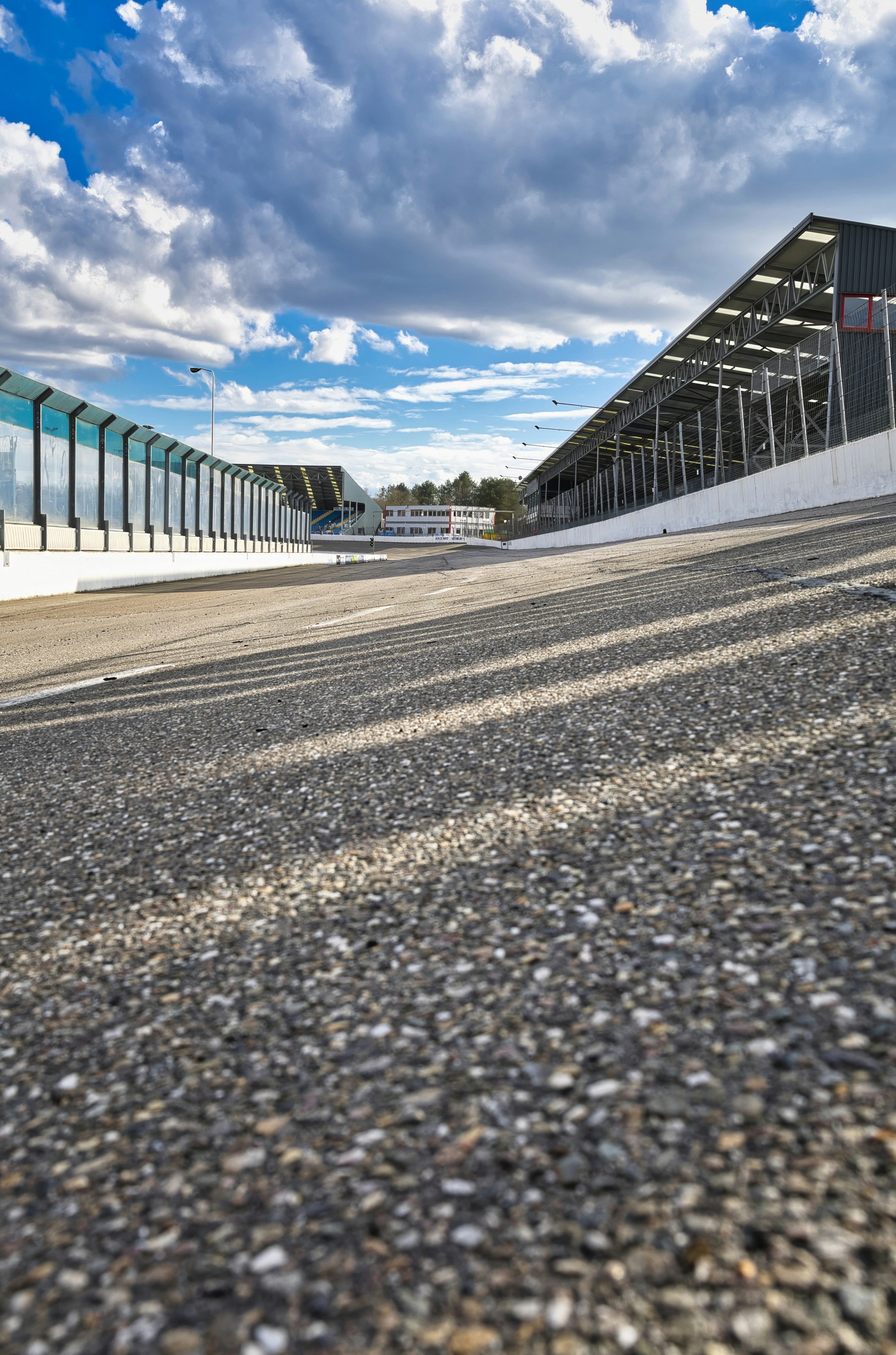 Bold Raceway: Sunlit Curves along the Paved Pit Lane