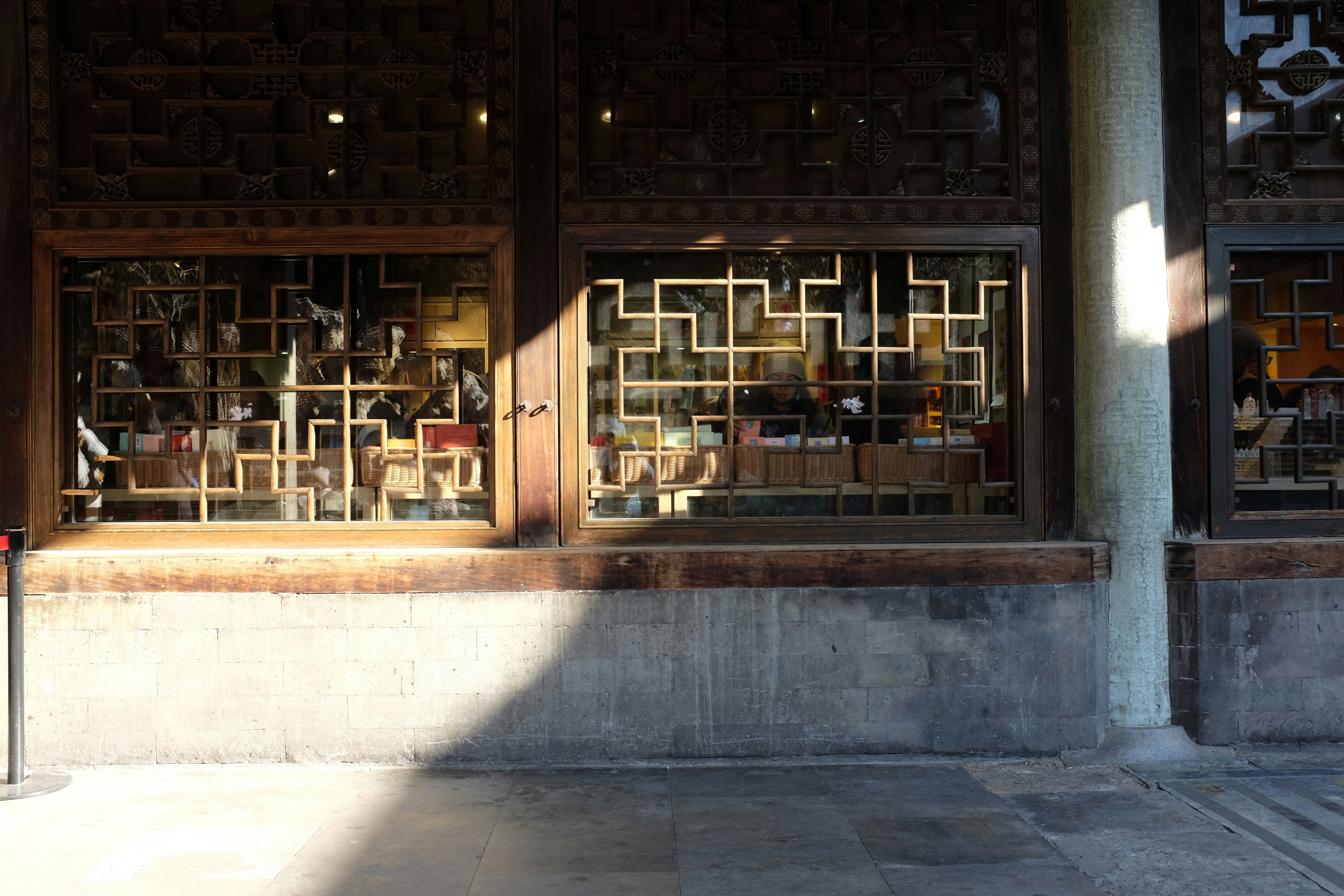 Shadowed Courtyard Lattice Under Warm Light