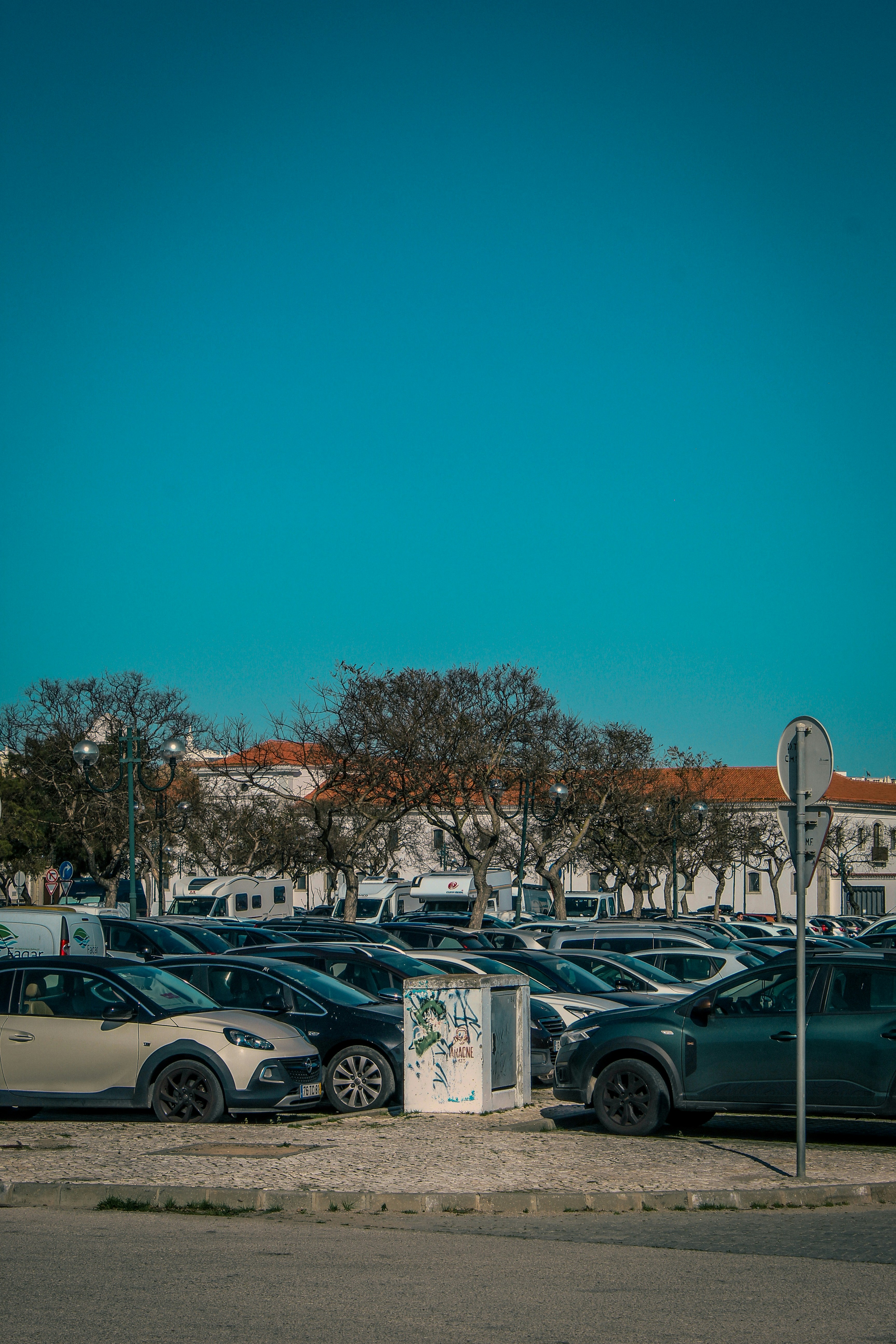 Car Lot Under a Sapphire Sky