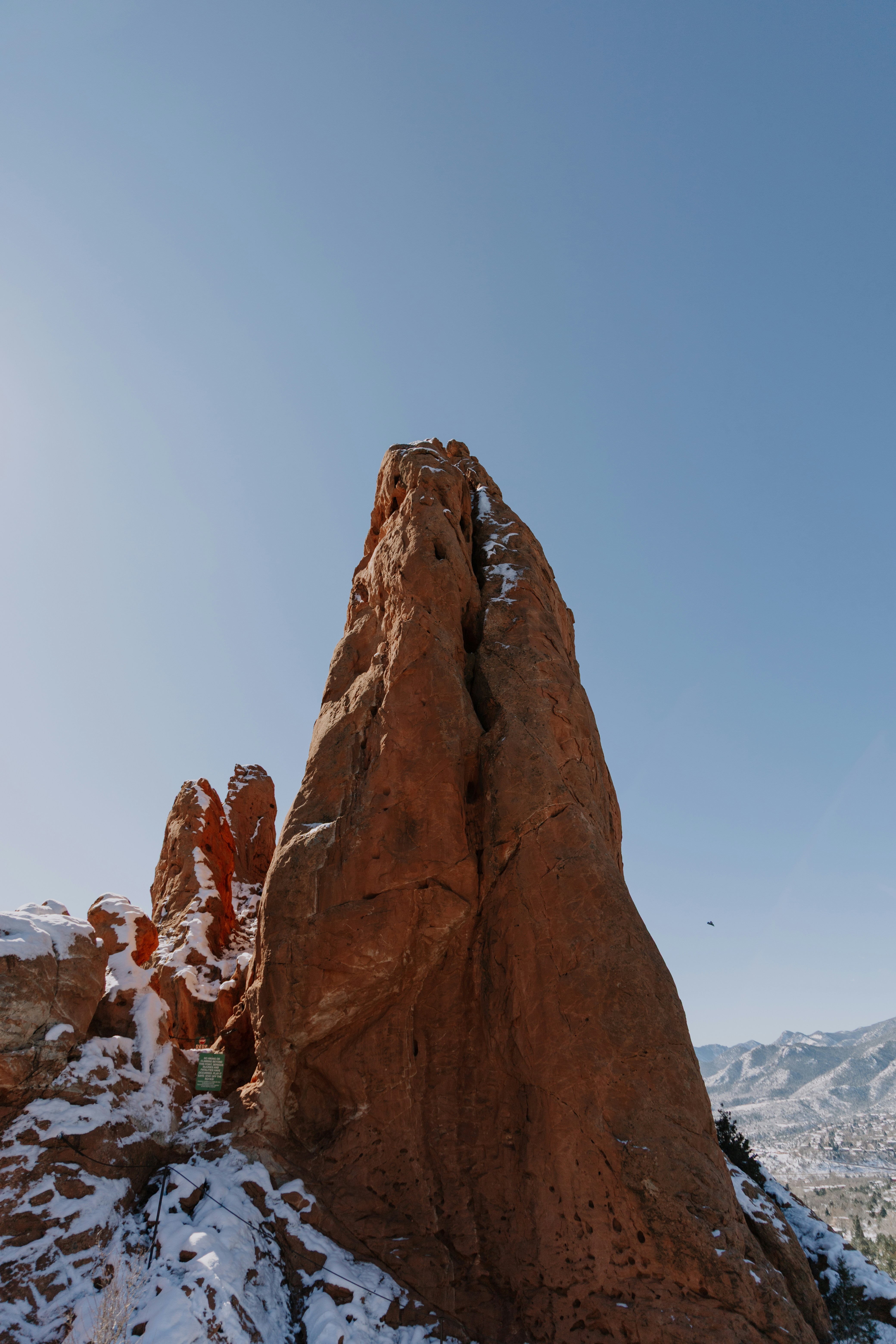 Crimson Spire Against a Clear Blue Sky