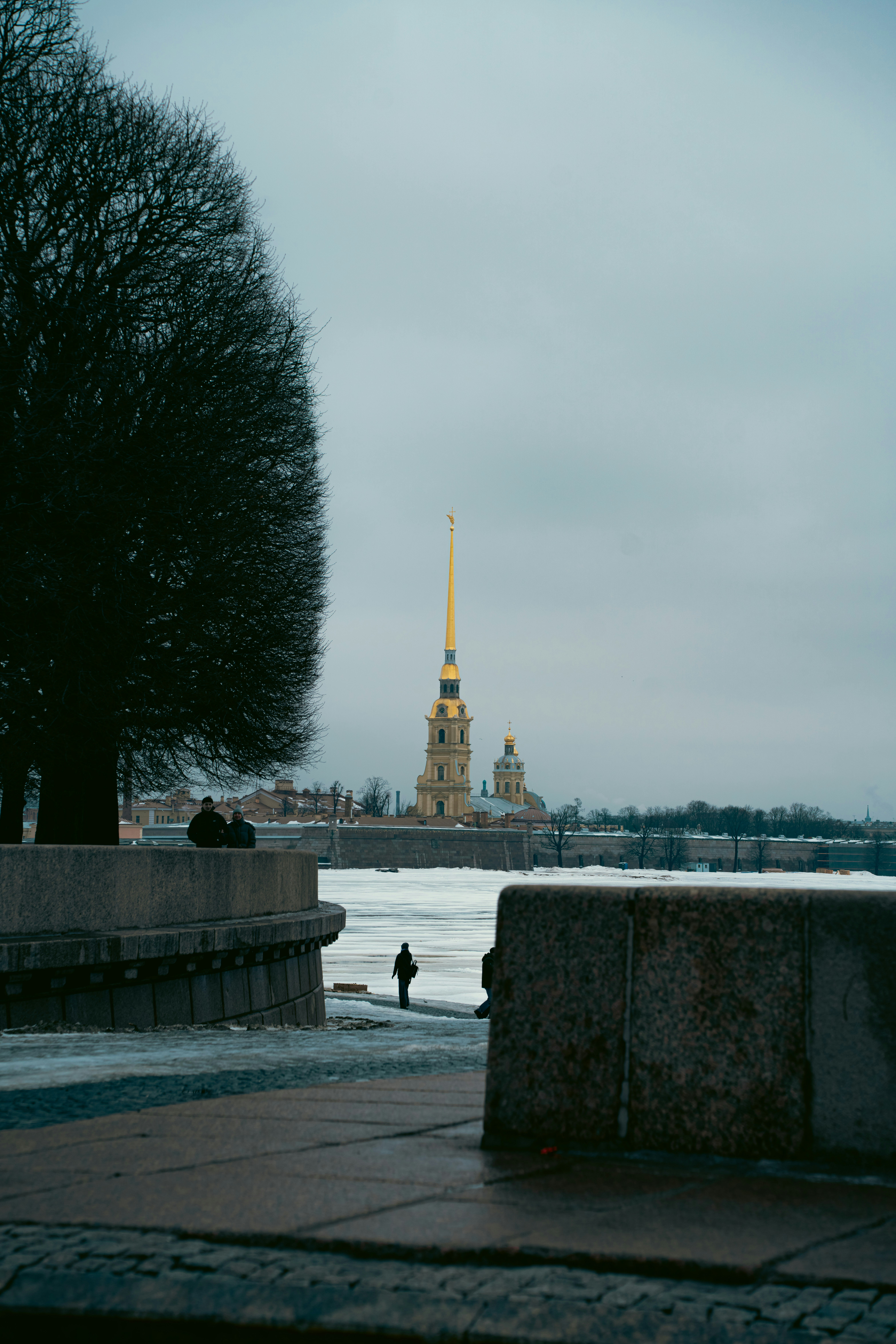 Spire and Silhouette by the River