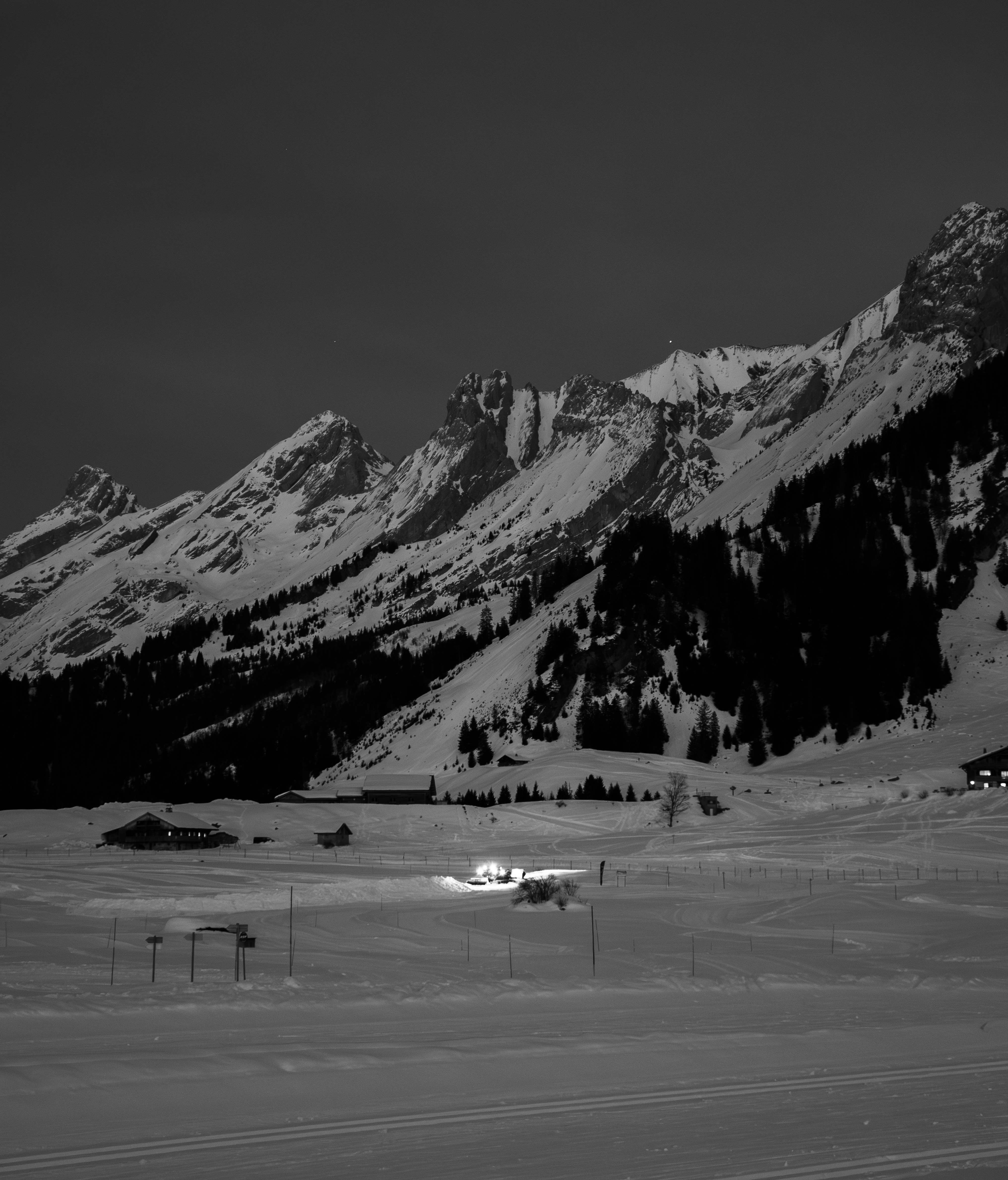 Snowbound Peaks Under Starlit Silence
