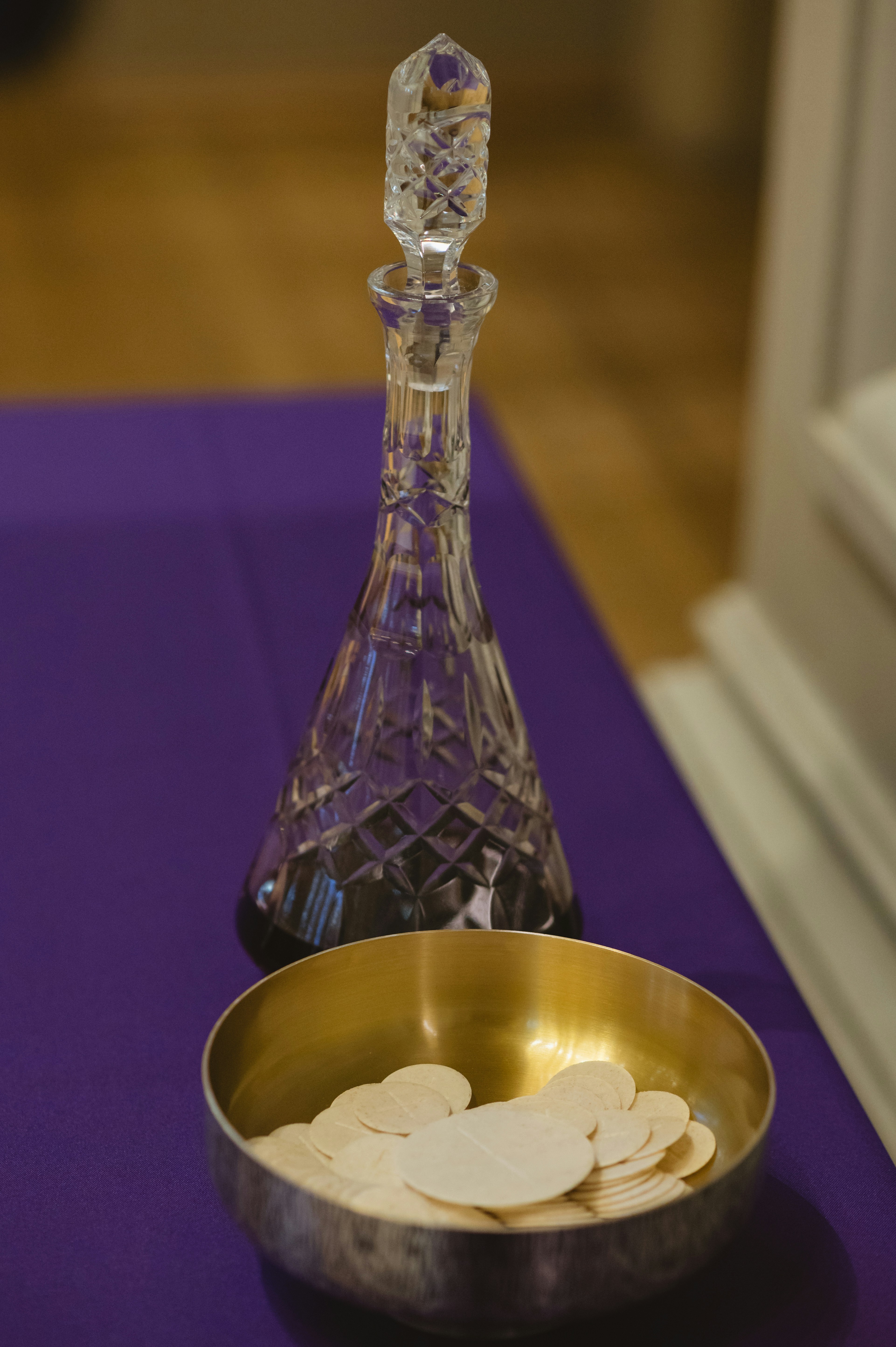 Crystal Bottle on Purple Velvet with Coin Dish Neatly Arranged
