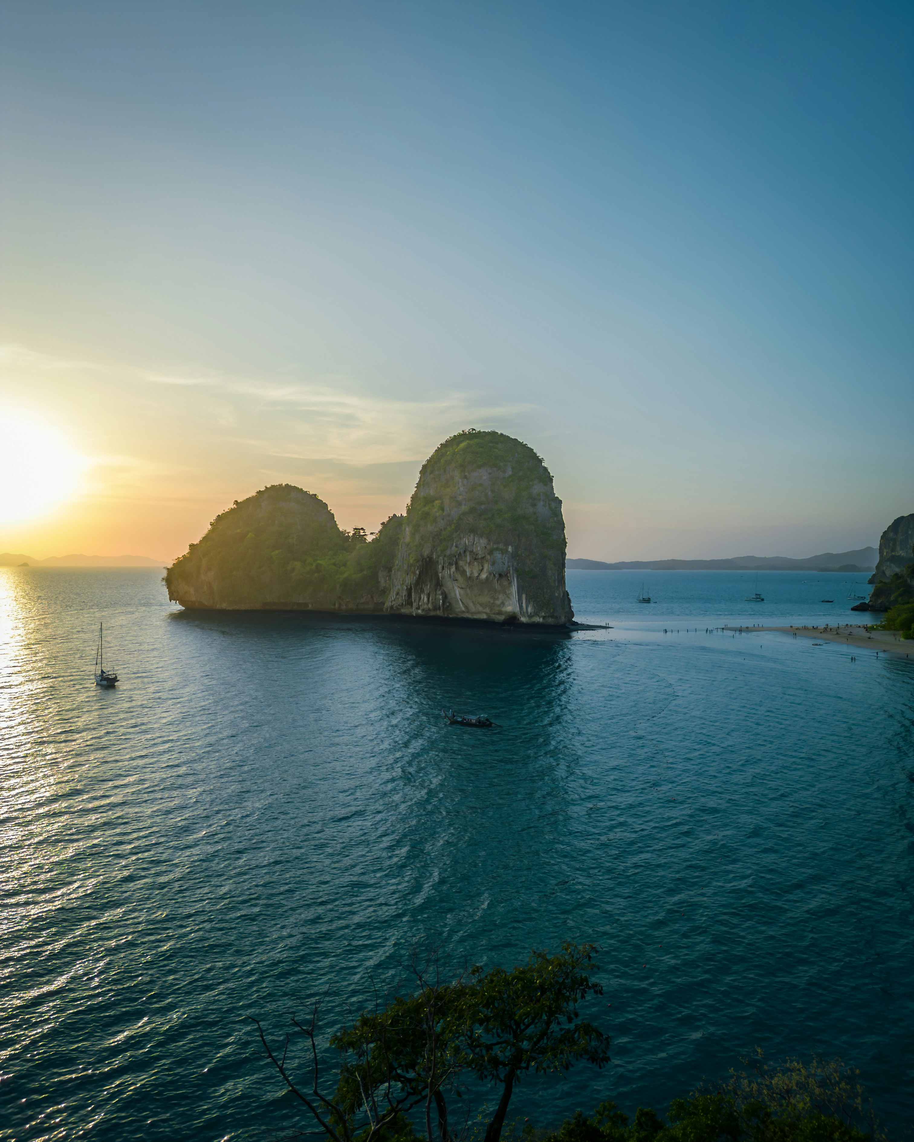 Sunlit Island Duo: A Quiet Moment at Sea
